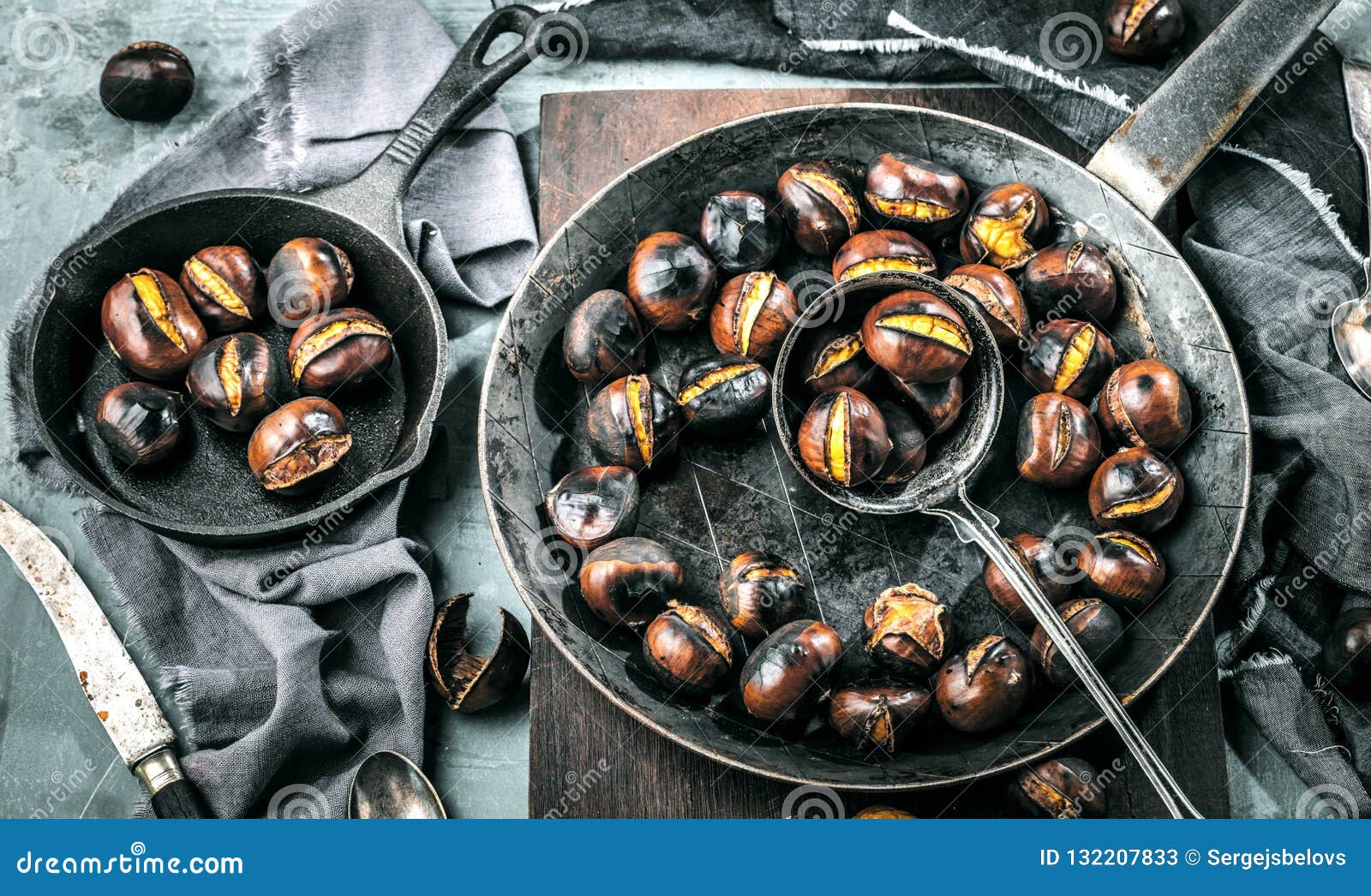 Roasted Chestnuts Served in Chestnut Pan on an Old Table. Stock Image ...