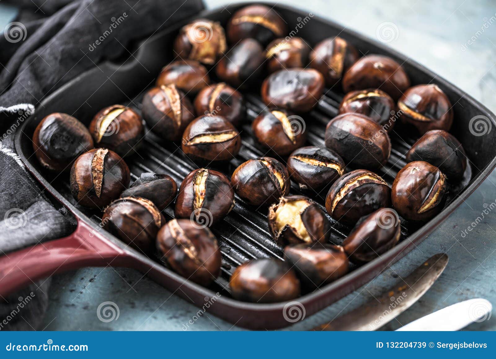 Roasted Chestnuts Served in Chestnut Pan on an Old Table. Stock Image ...
