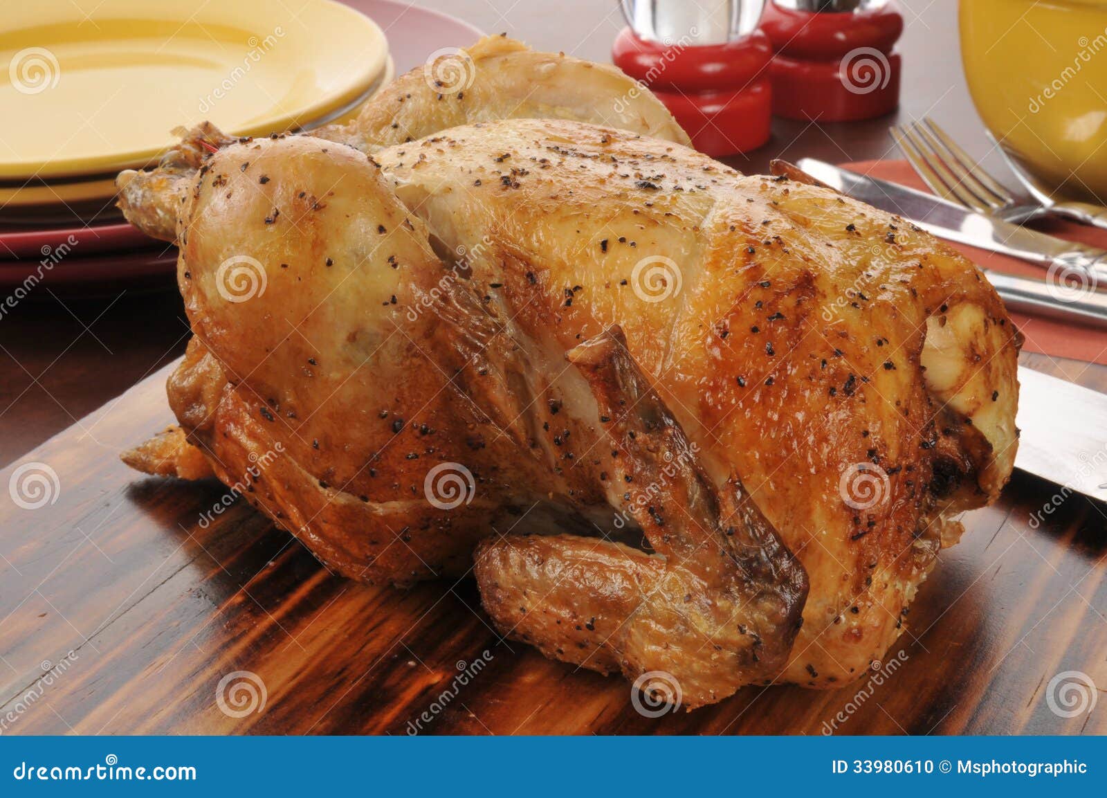 Roasted Chicken on a Cutting Board Stock Photo - Image of board, meat ...
