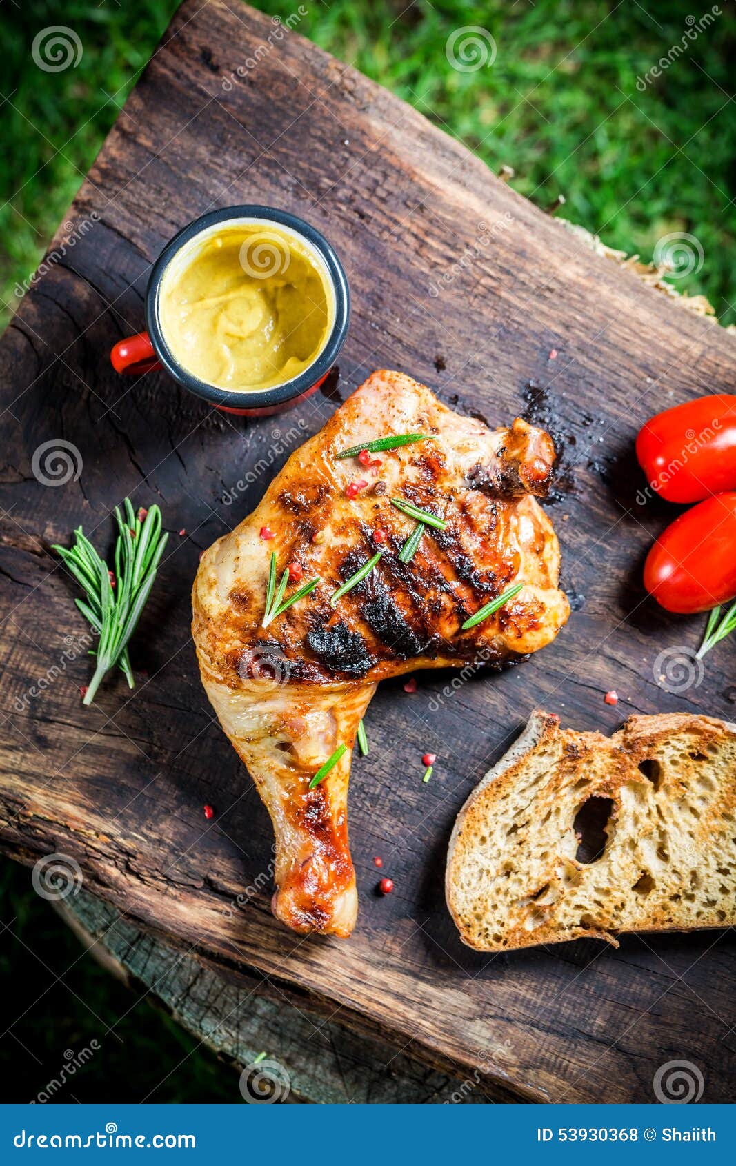 Roasted Chicken Leg with Toast and Cherry Tomato Stock Photo - Image of ...