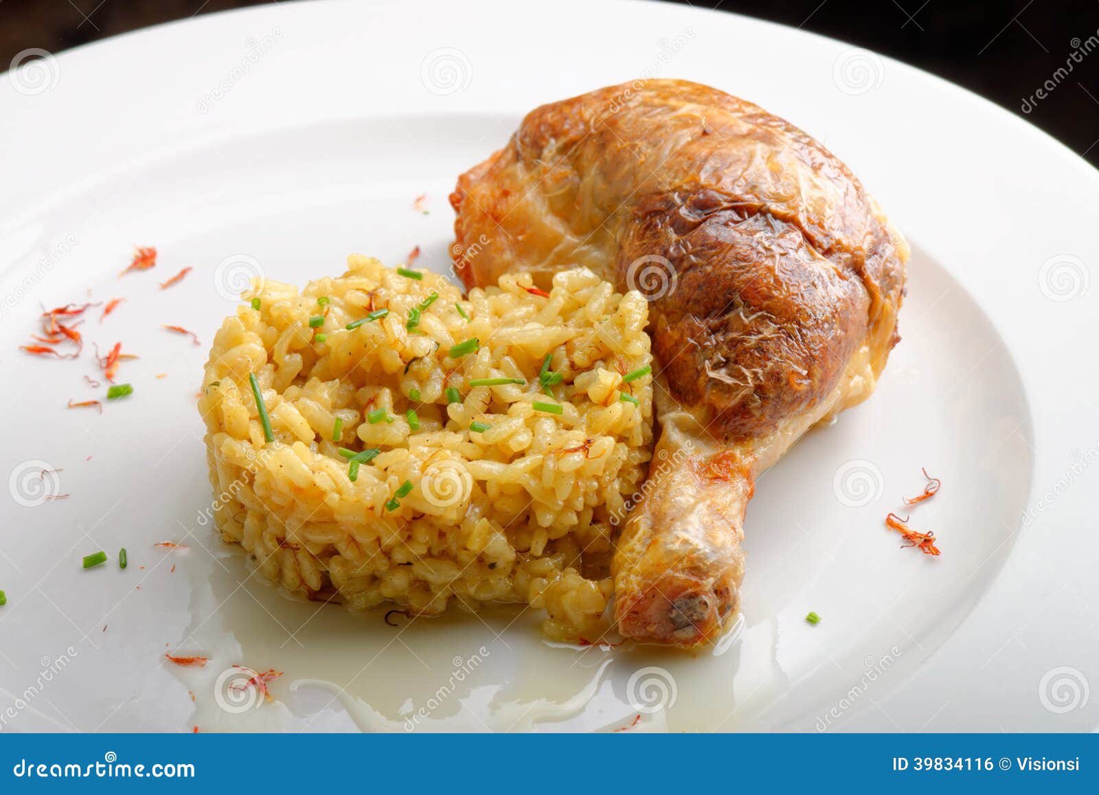 Roasted Chicken Legs with Cooked Saffron Rice Stock Photo - Image of ...