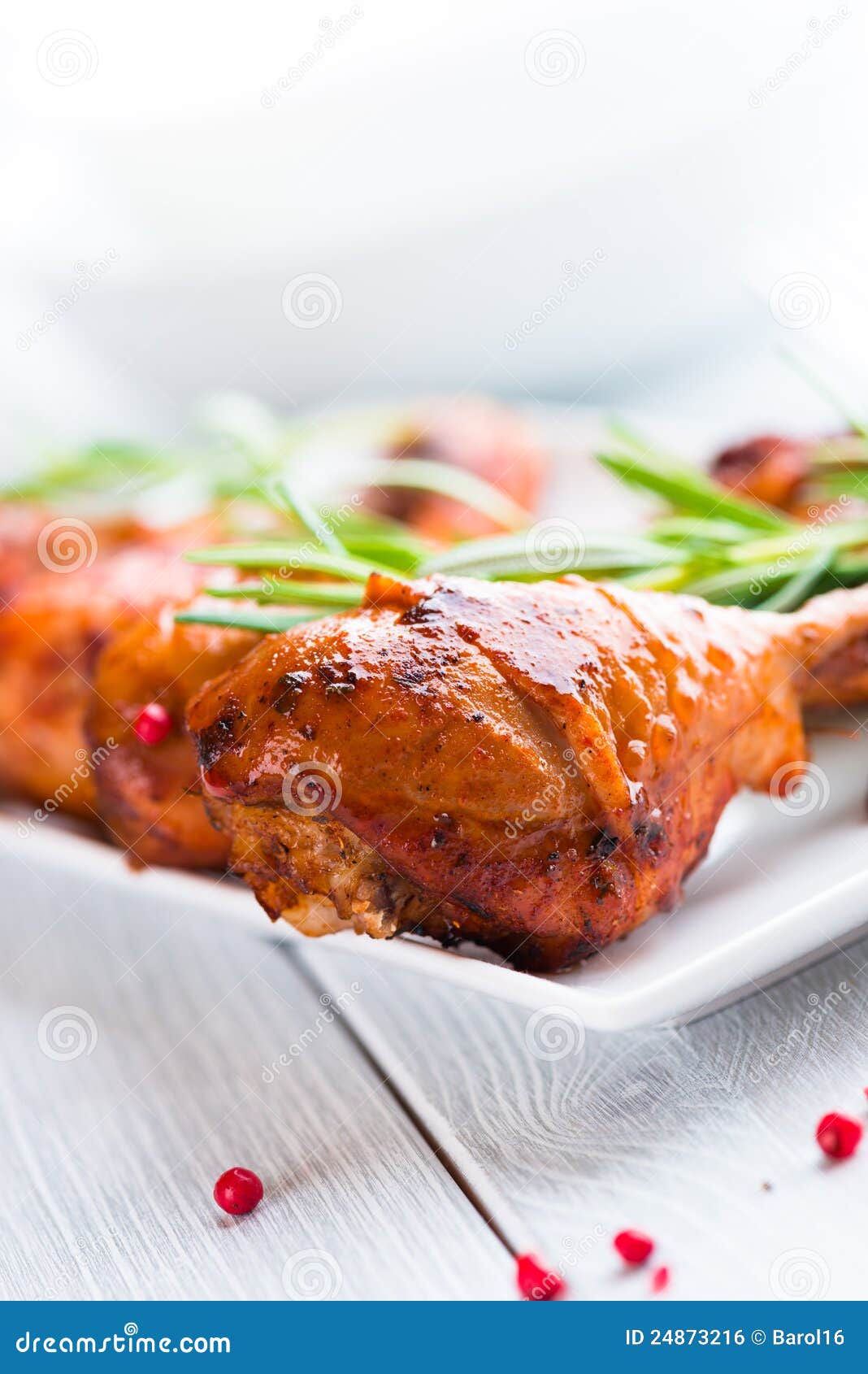 Roasted Chicken Legs with Rosemary on a Plate Stock Photo - Image of ...