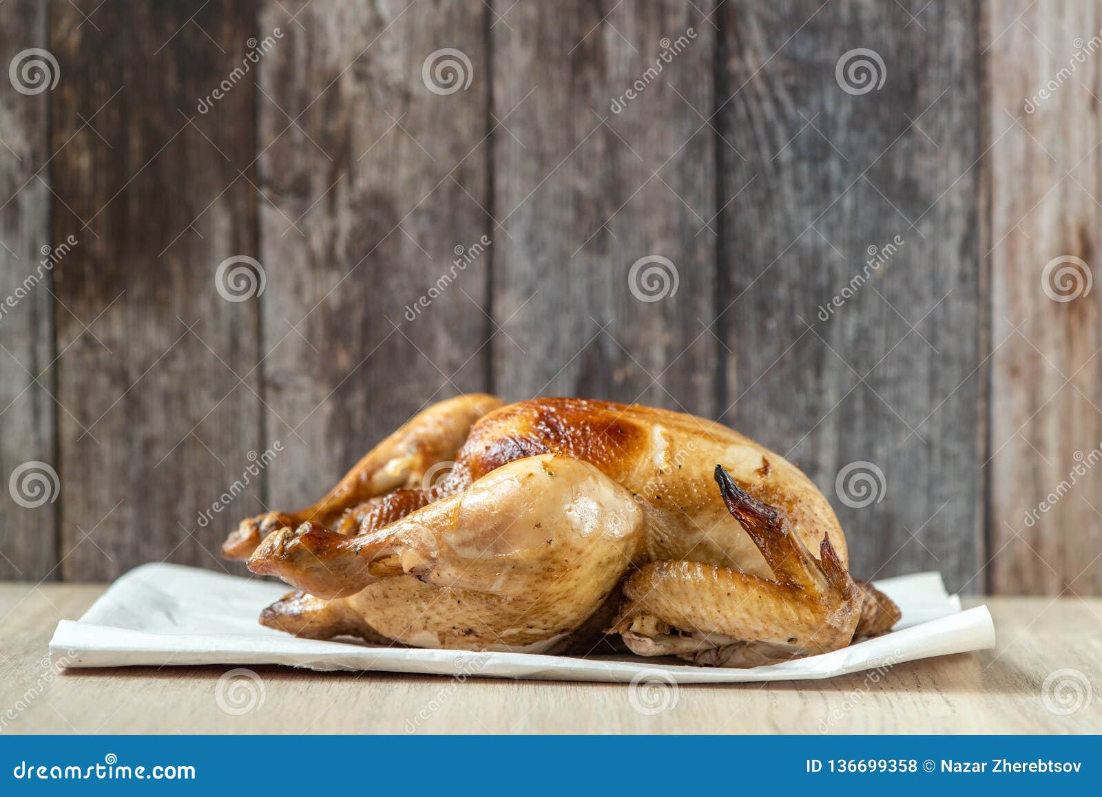 Roasted Chicken on Light Table. Side View Stock Photo - Image of ...