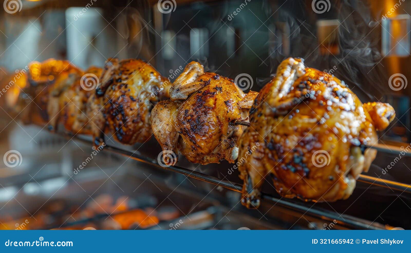 Roasted Chicken in a Row Turning at Industrial Roaster Stock Photo ...