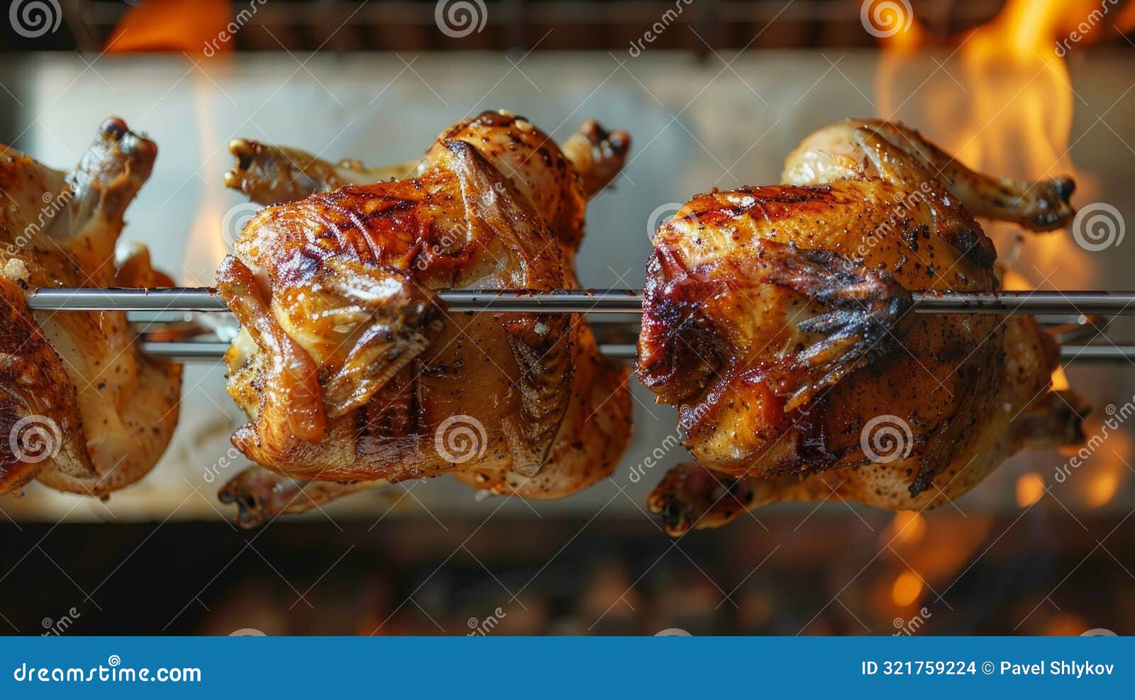 Roasted Chicken in a Row Turning at Industrial Roaster Stock Photo ...
