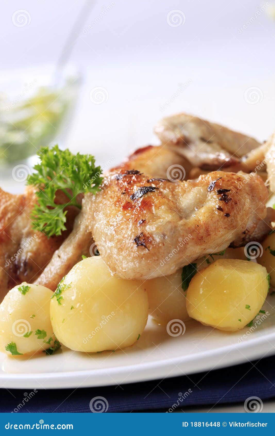 Roasted Chicken Wings and Potatoes Stock Photo - Image of appetizing ...