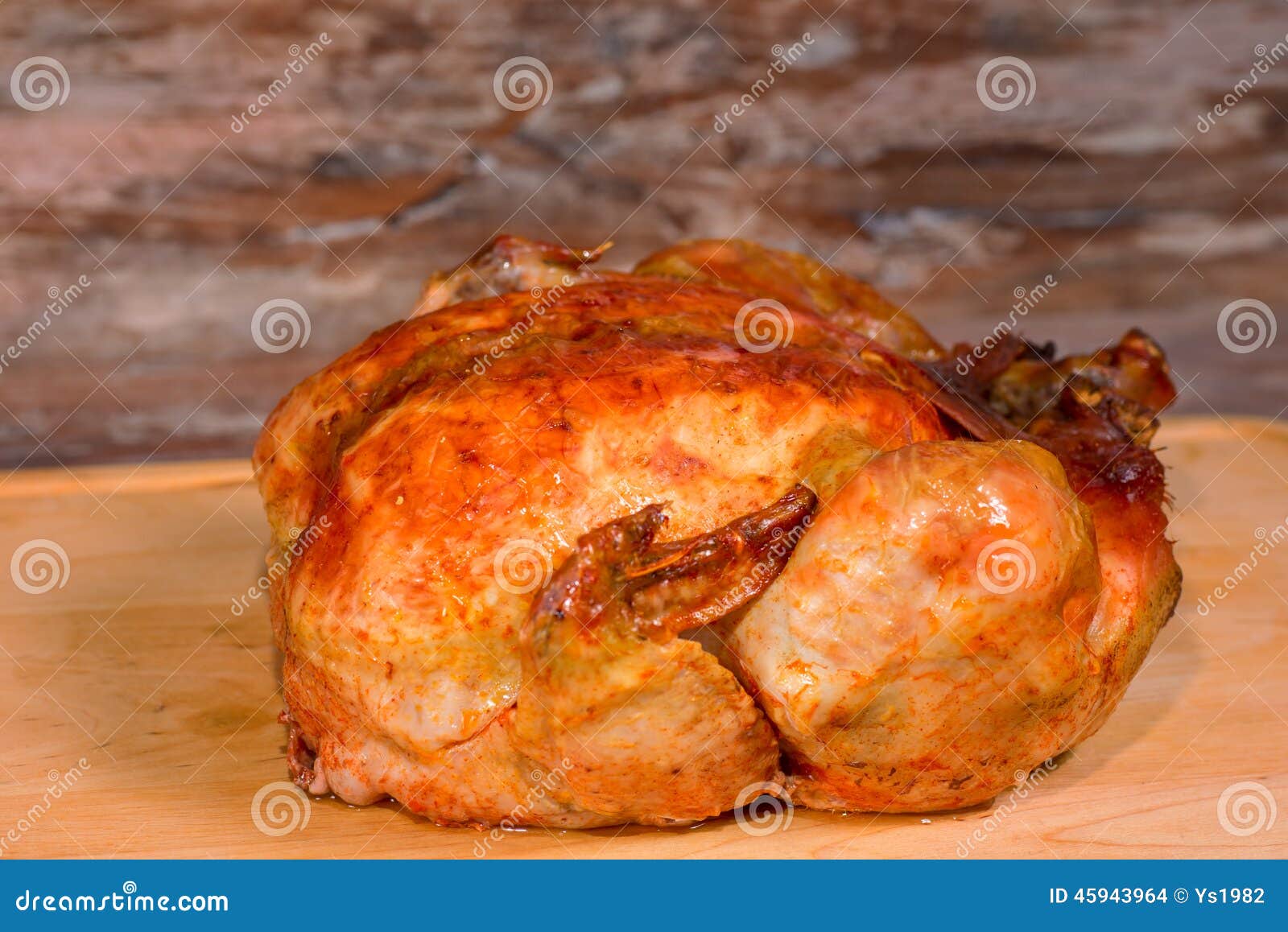 Roasted Chicken on Wooden Background Stock Photo - Image of herb, food ...