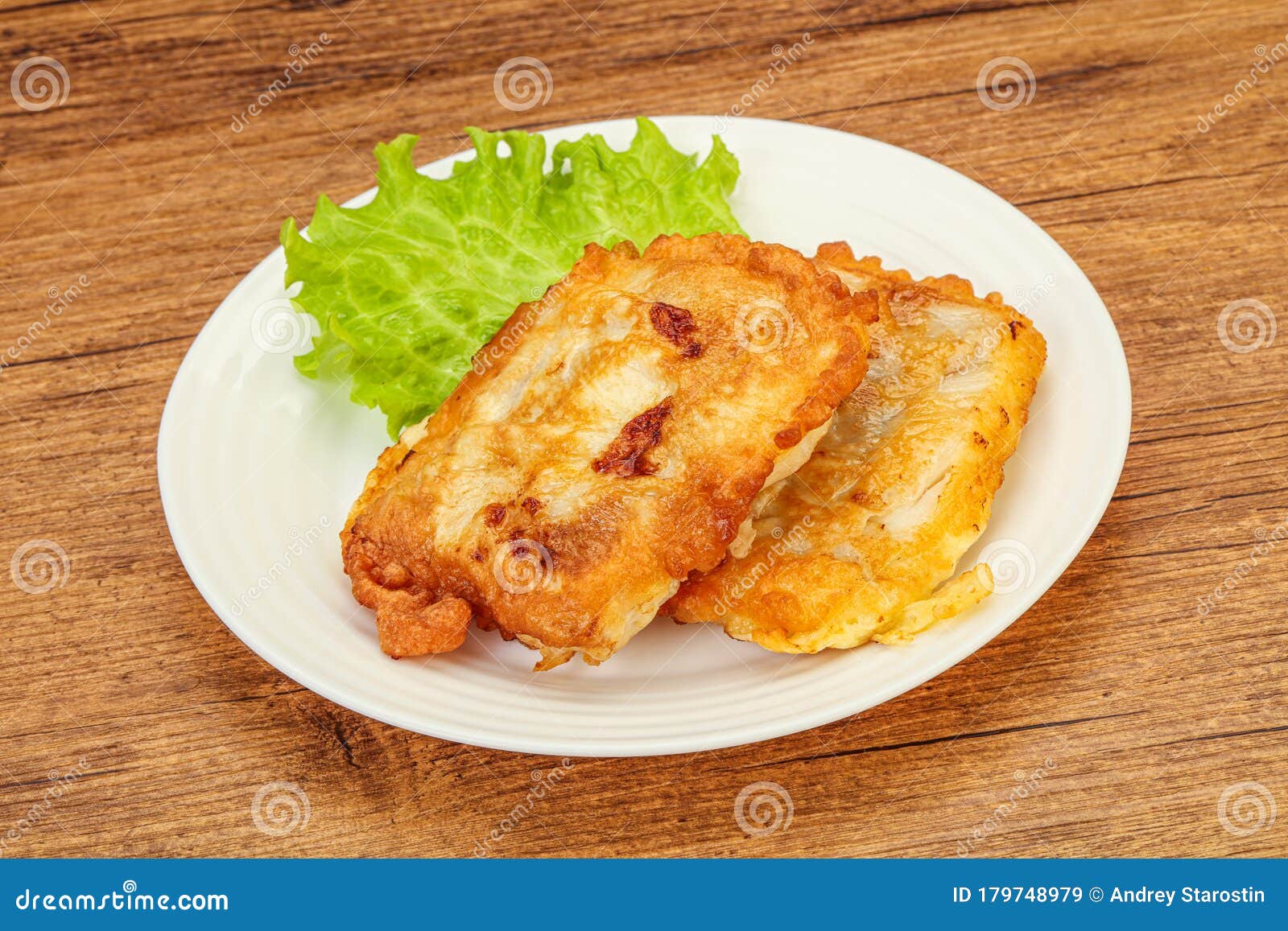 Roasted cod fish in bread stock image. Image of nutrition - 179748979