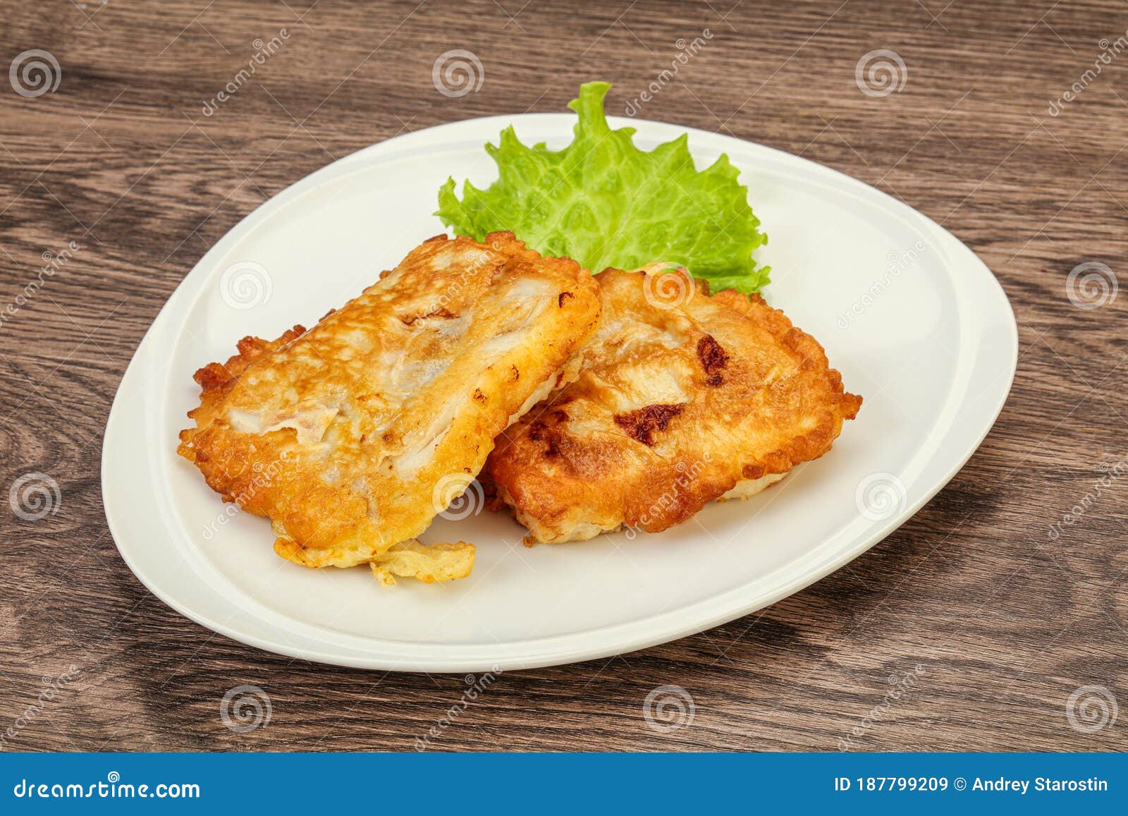Roasted cod fish in bread stock image. Image of seafood - 187799209