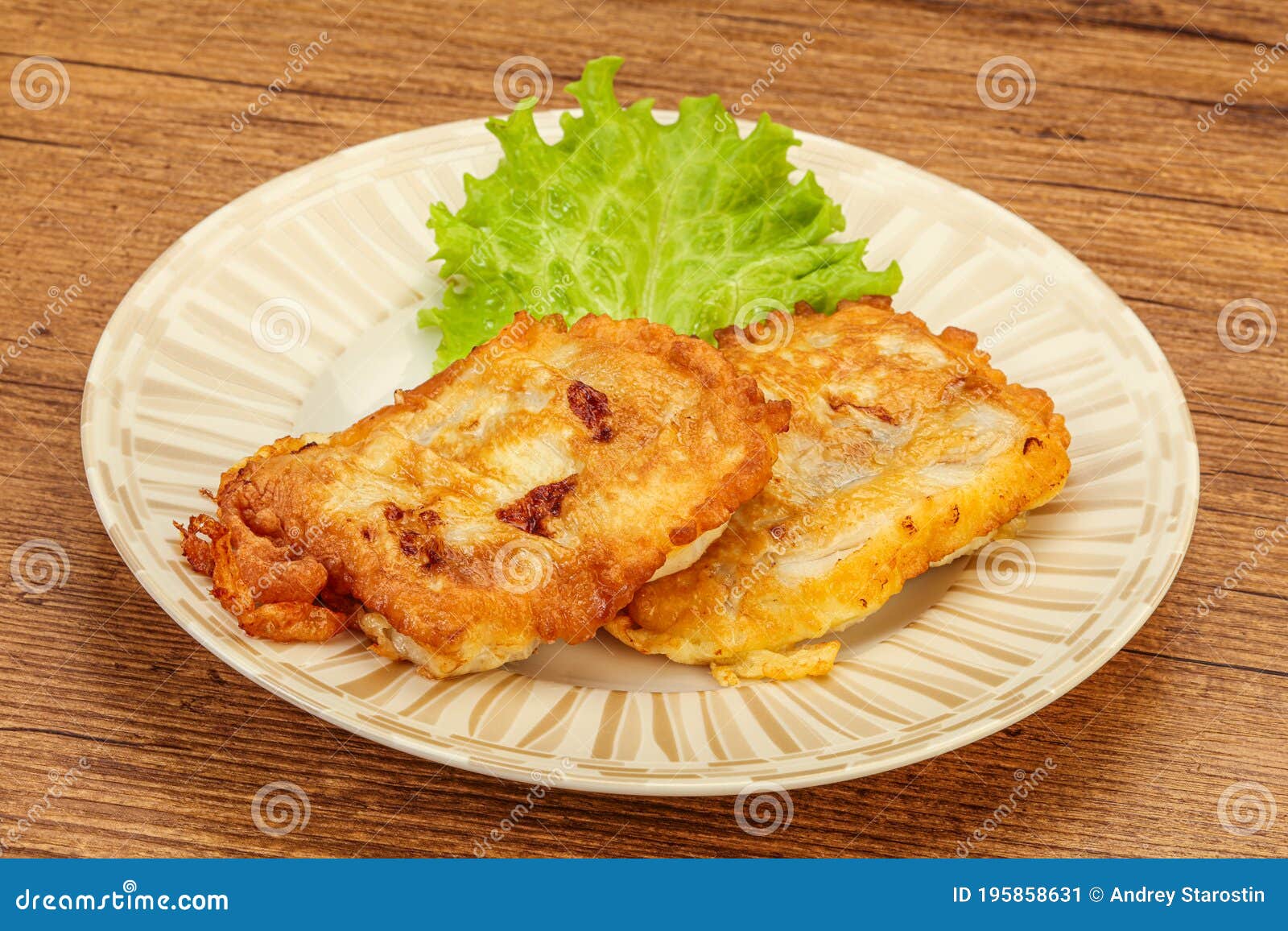Roasted cod fish in bread stock image. Image of white - 195858631