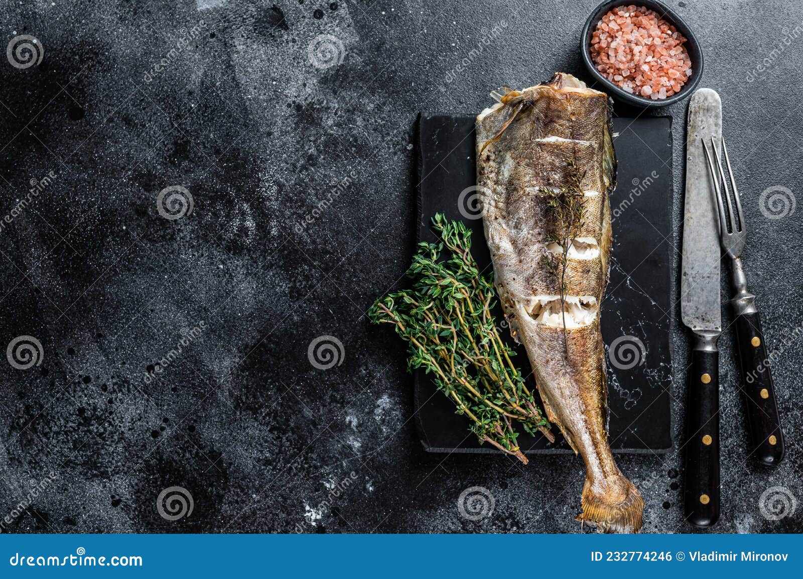 Roasted Cod White Fish with Thyme on Marble Board. Black Background ...