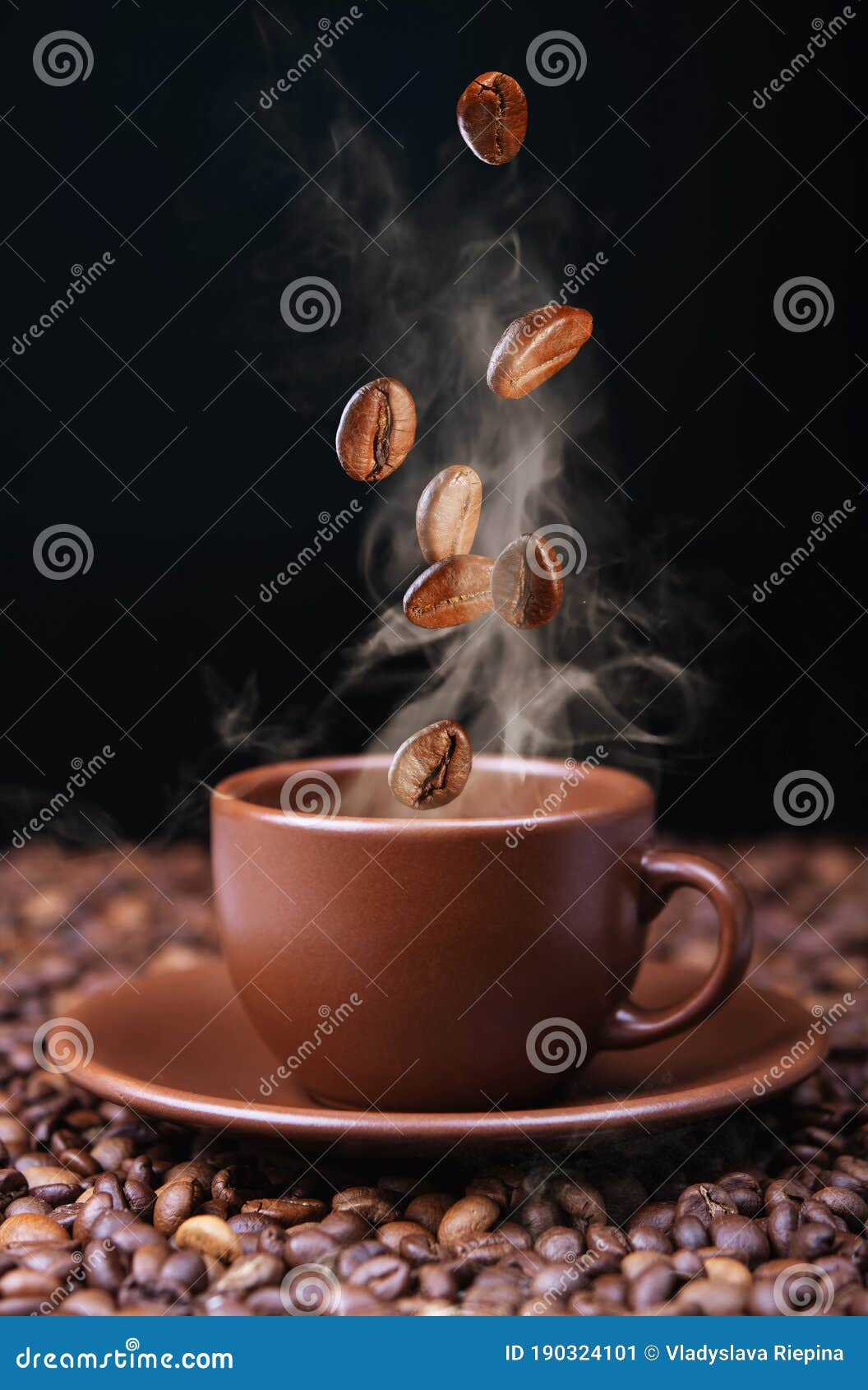 Roasted Coffee Beans Falling into Coffee Cup Stock Image - Image of ...