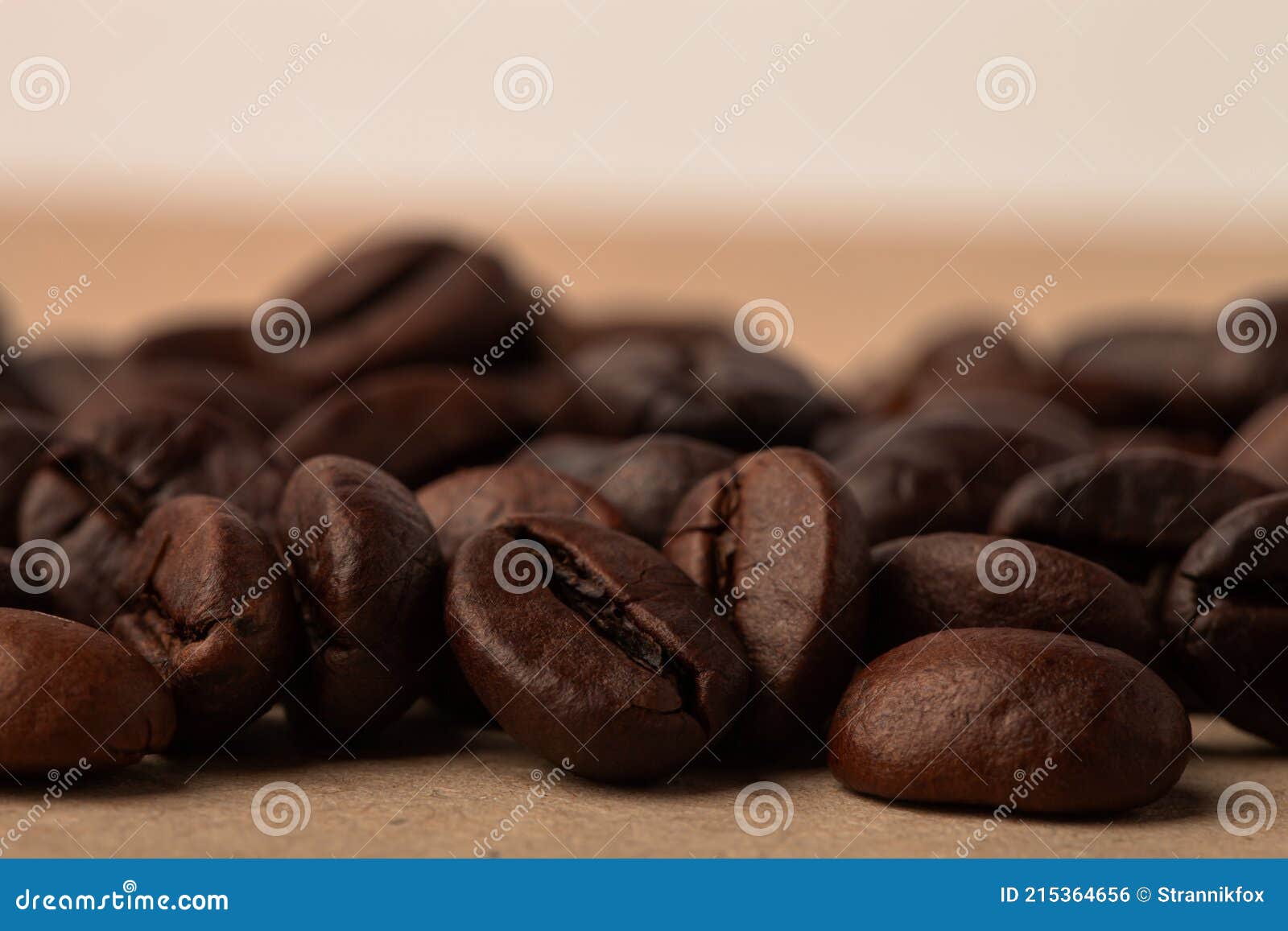 Roasted Coffee Beans on the Light Background for Wallpaper or Decor ...