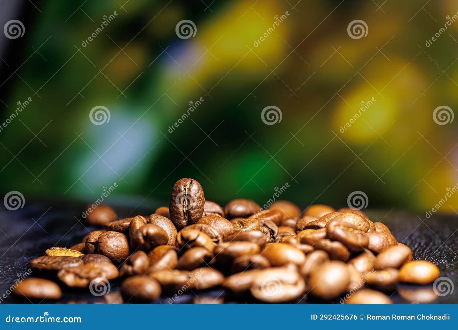 Roasted Coffee Beans on the Table. Coffee Beans on the Table Stock ...