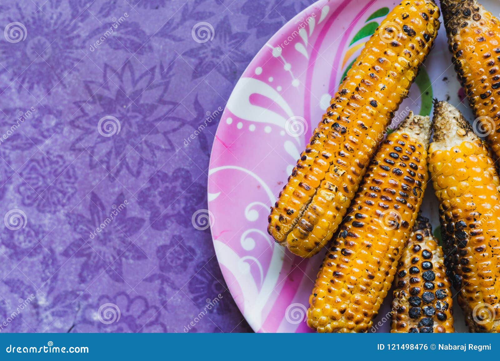 Roasted Corn on the Plate stock photo. Image of kitchen - 121498476