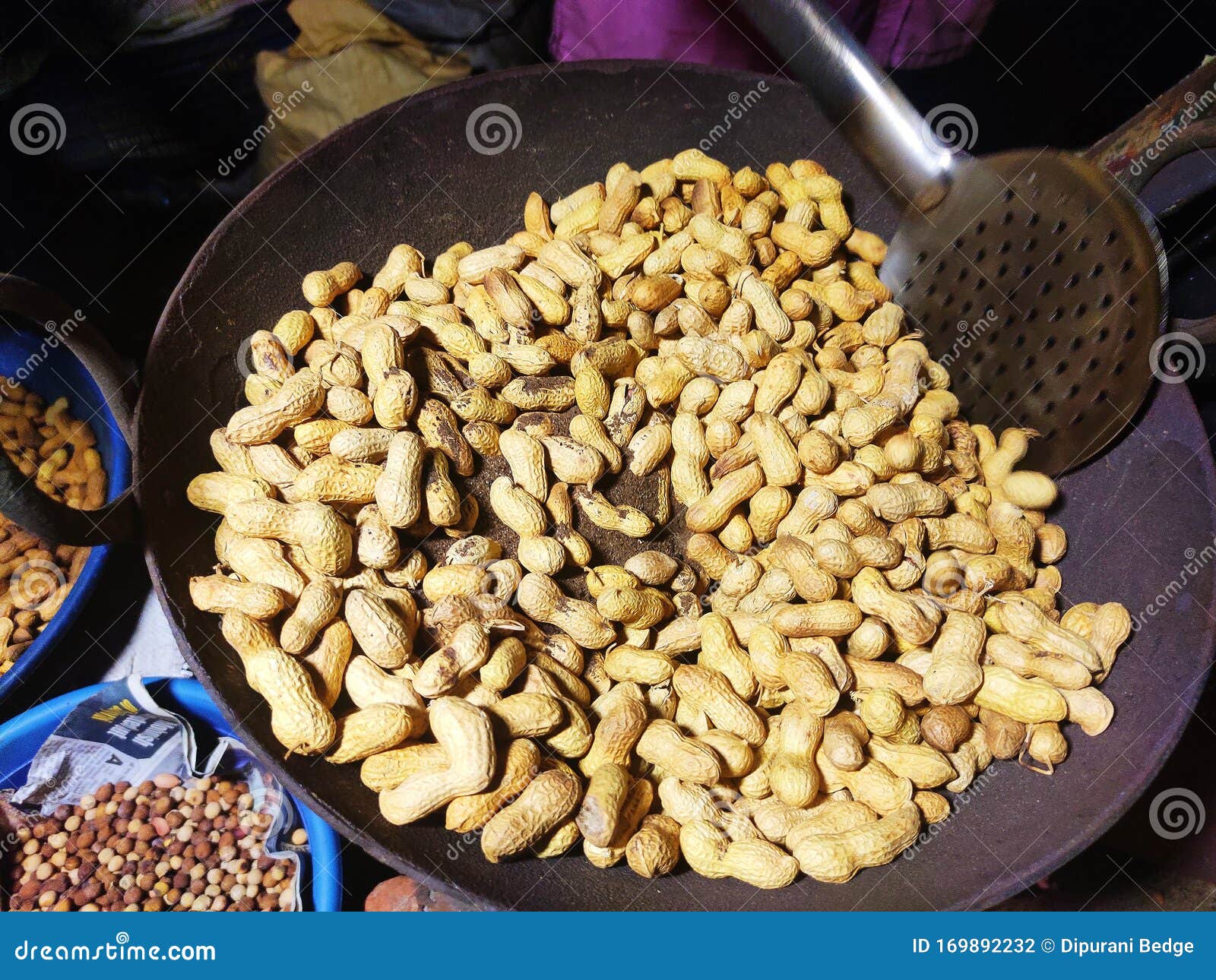 Roasted Dry Groundnuts in Iron Vessel with Spoon Stock Photo - Image of ...