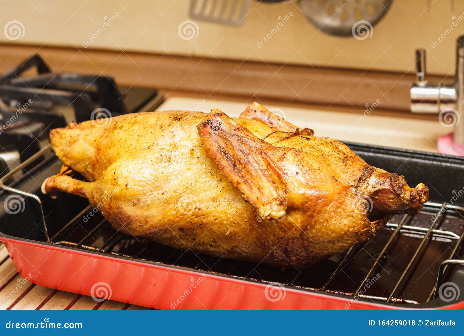 Roasted Duck in a Deep Pan with Grill Rack, Prepared Meal for ...