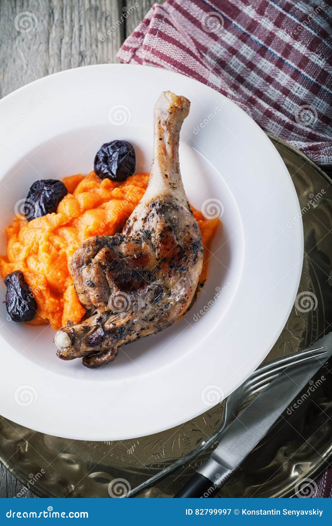 Roasted Duck Leg with Mashed Carrot and Dried Prunes Stock Image ...
