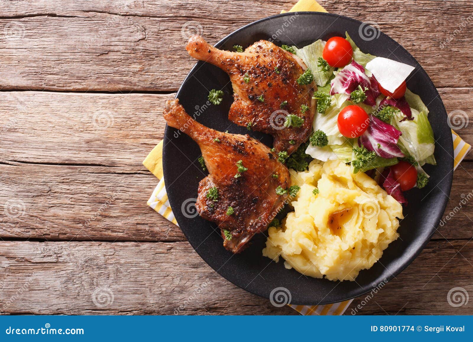 Roasted Duck Leg with Mashed Potatoes and Fresh Salad Closeup. H Stock ...