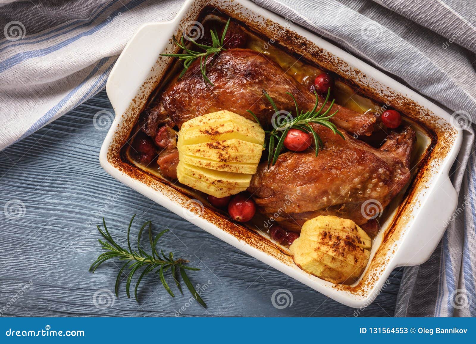 Roasted Duck Legs with Apples and Cranberries. Stock Image - Image of ...