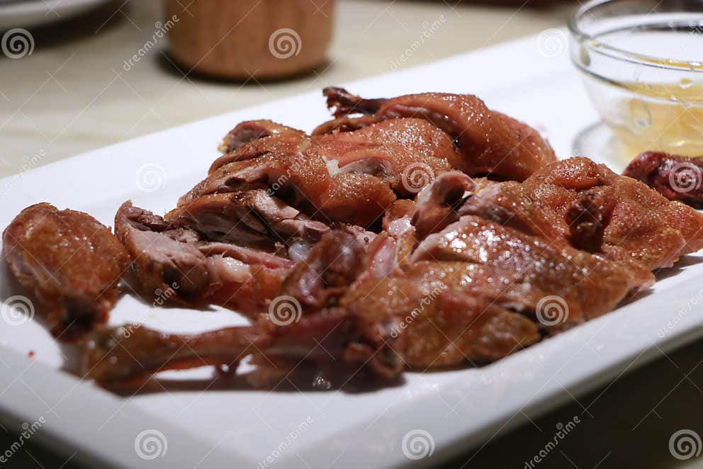 Roasted duck stock image. Image of indoor, cuisine, plate - 248568463