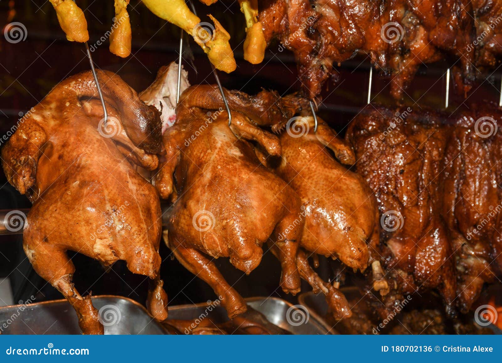 Roasted Ducks Hanging on Rack Showcase Stock Photo - Image of ...