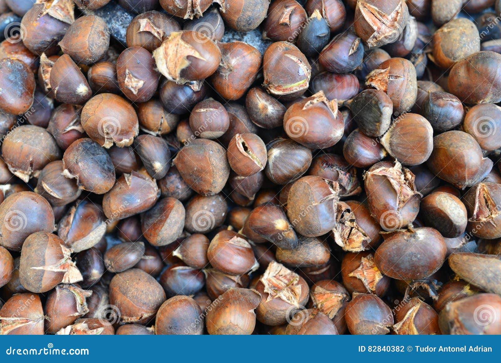 Roasted edible chestnuts stock photo. Image of texture - 82840382