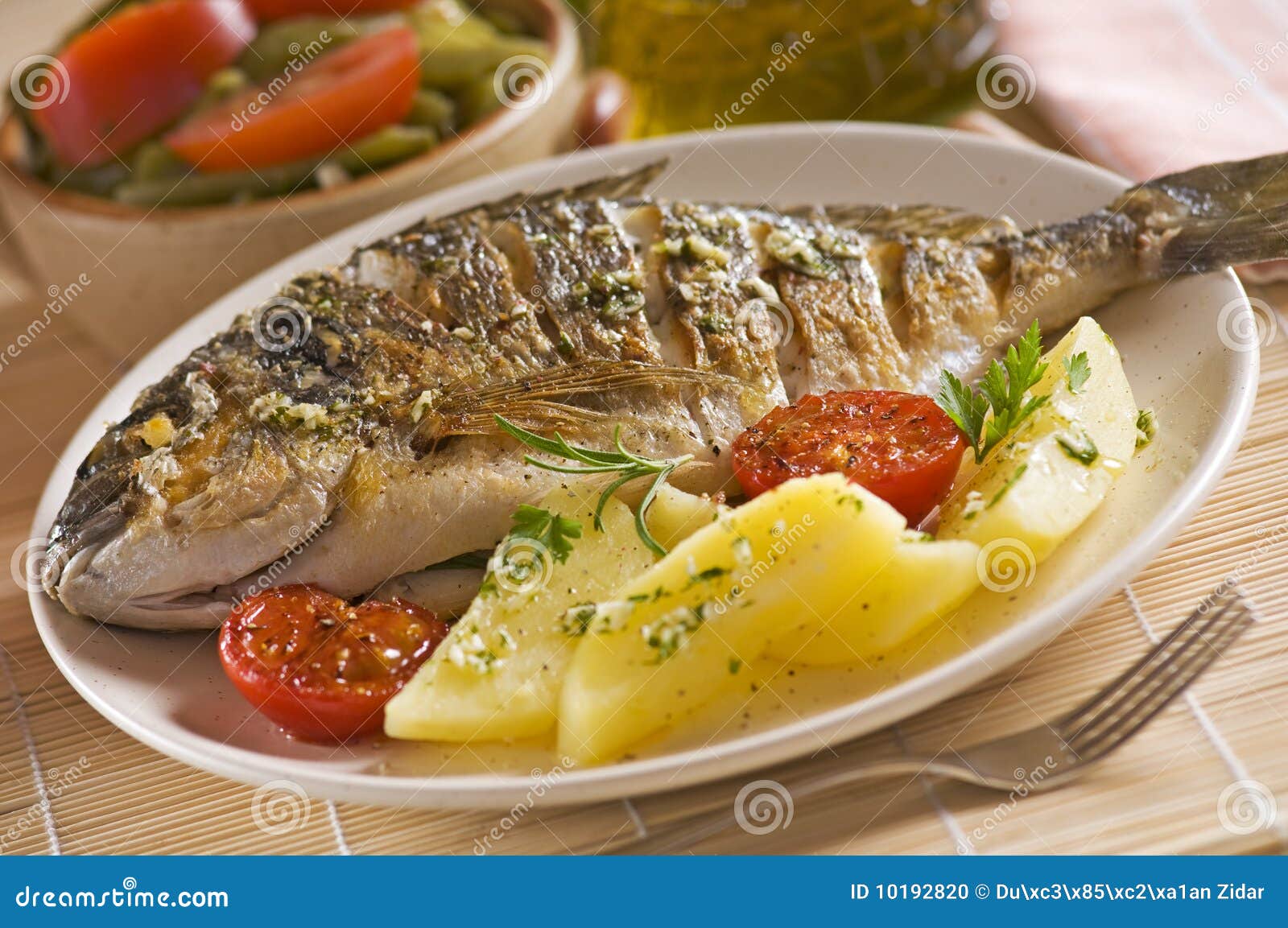 Roasted fish stock photo. Image of garlic, tomato, gourmet - 10192820