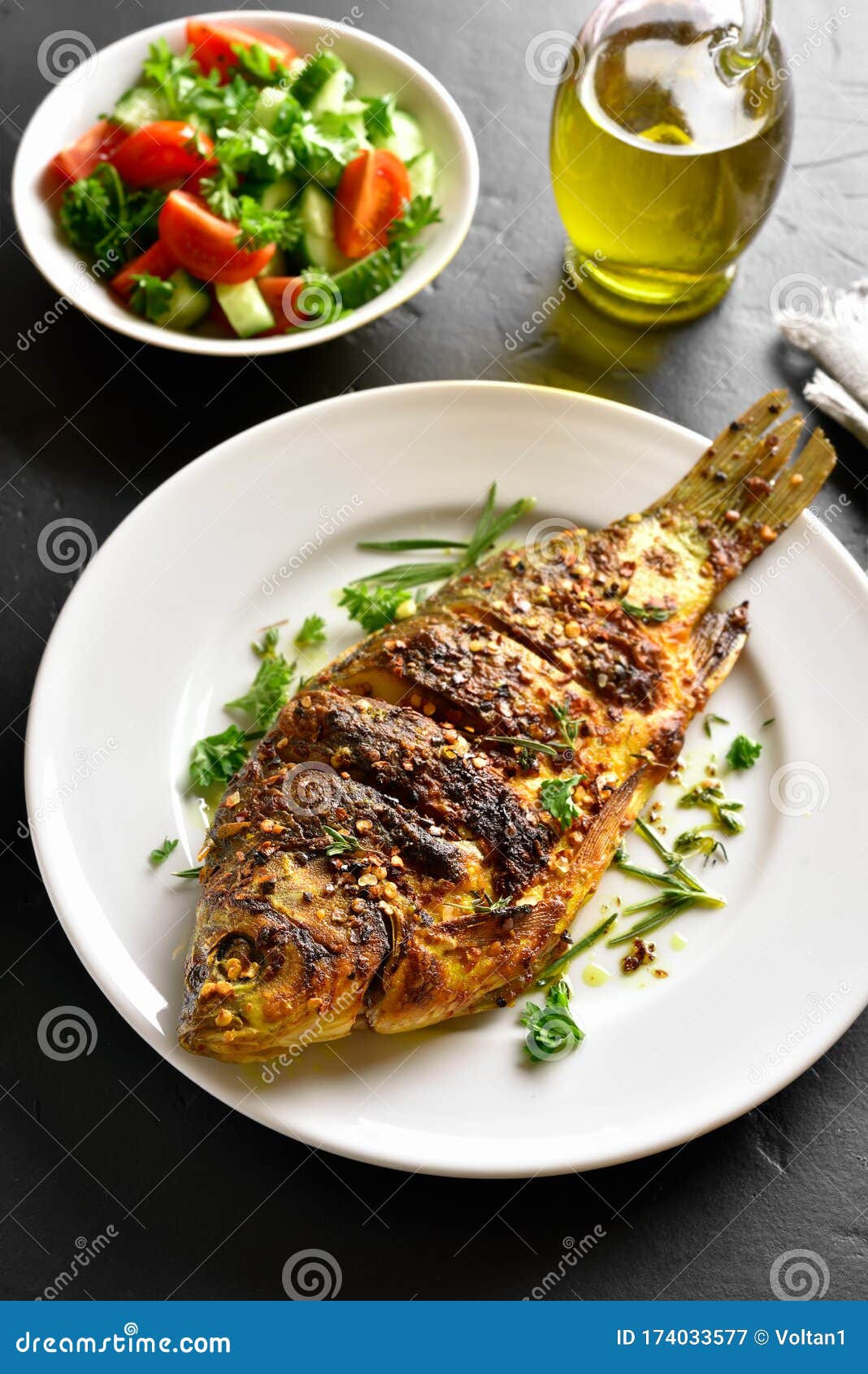 Roasted fish on plate stock image. Image of grill, greens - 174033577
