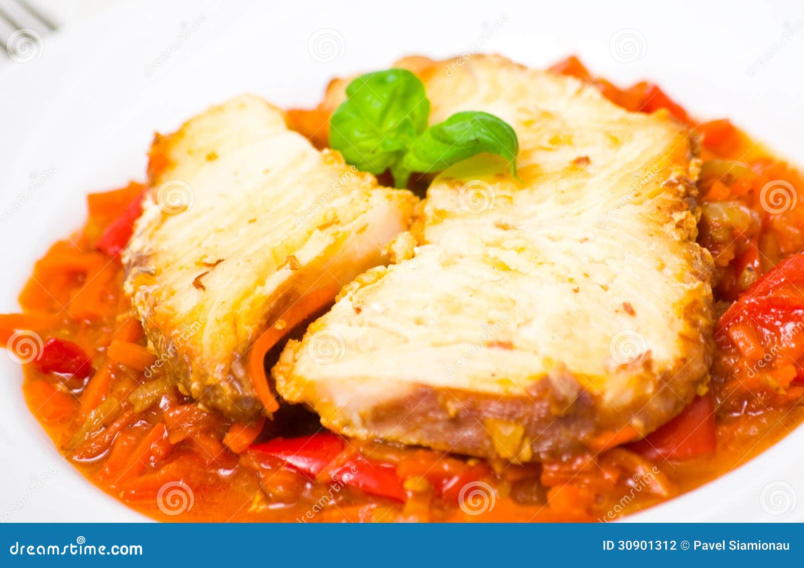 Roasted Fish in Tomato Marinade with Carrots and Red Pepper Stock Photo ...