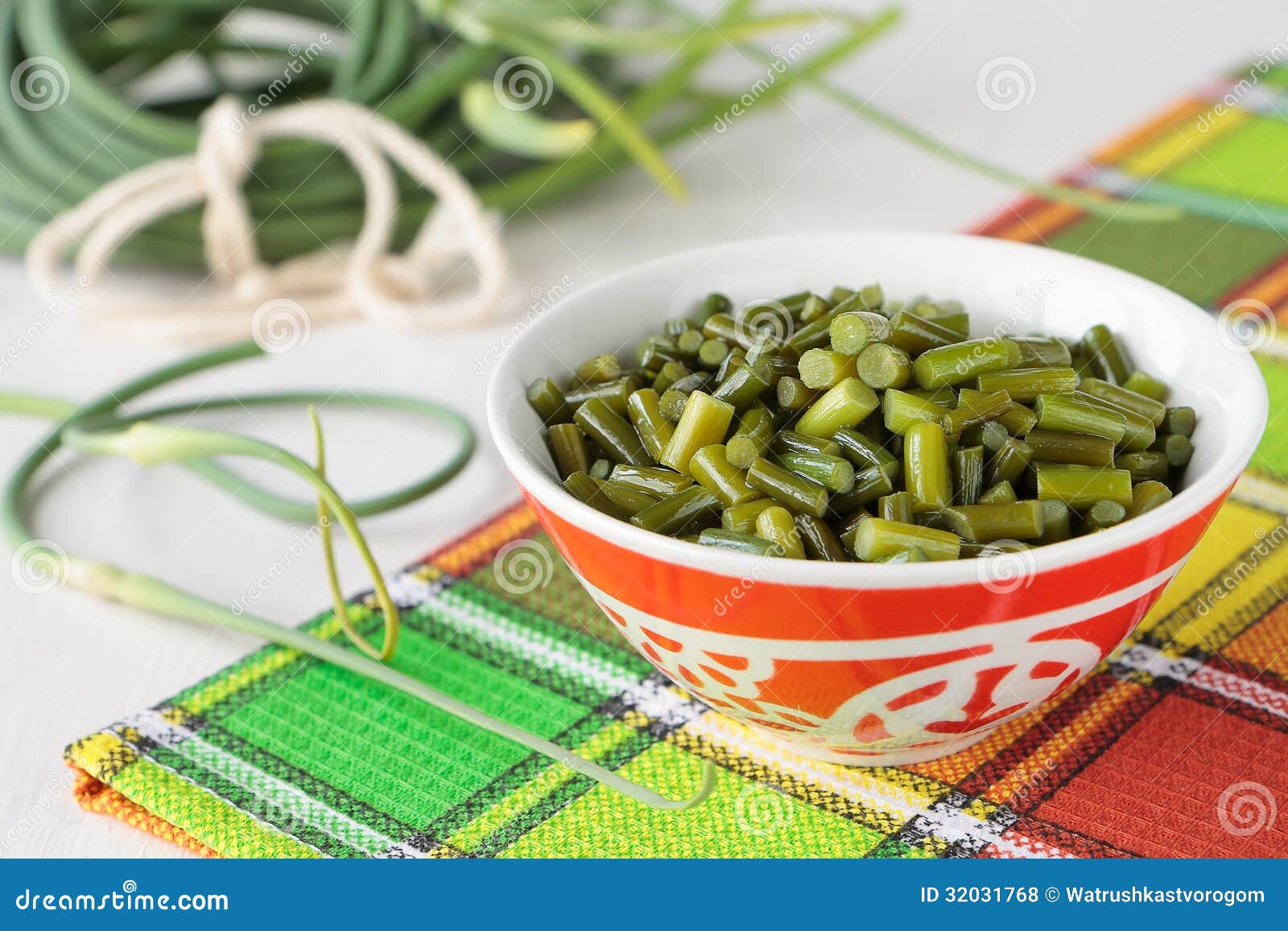 Roasted Garlic Stalks in Bowl Stock Photo - Image of cooking, stalk ...