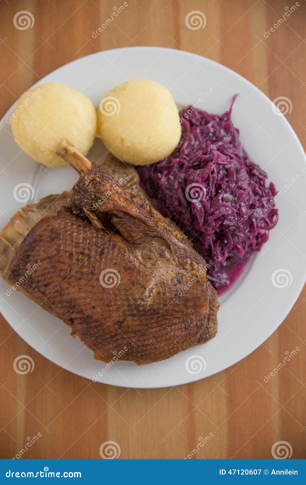 Roasted Goose Leg with Braised Red Cabbage Stock Image - Image of ...
