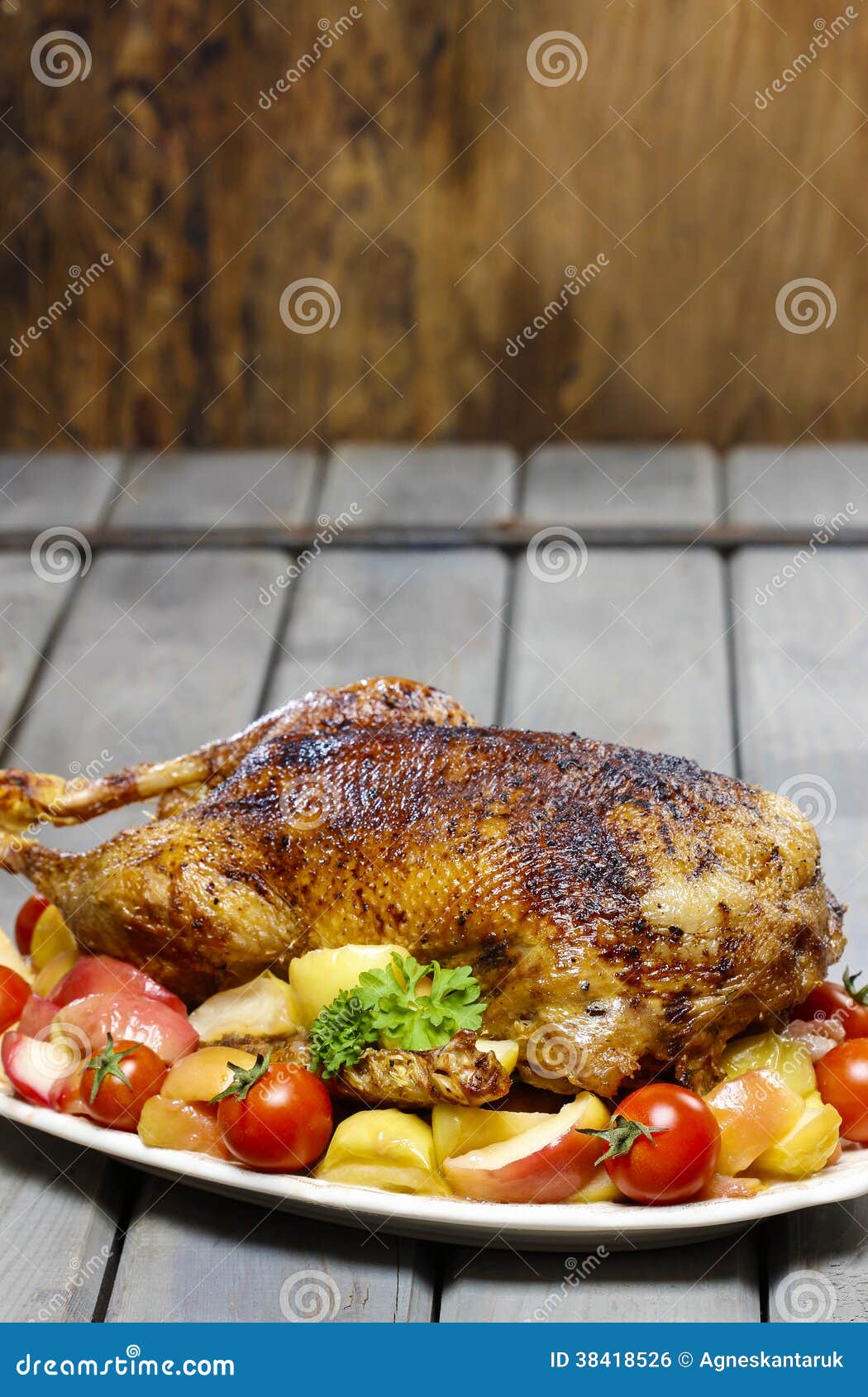 Roasted Goose on Wooden Table Stock Photo - Image of plank, portion ...