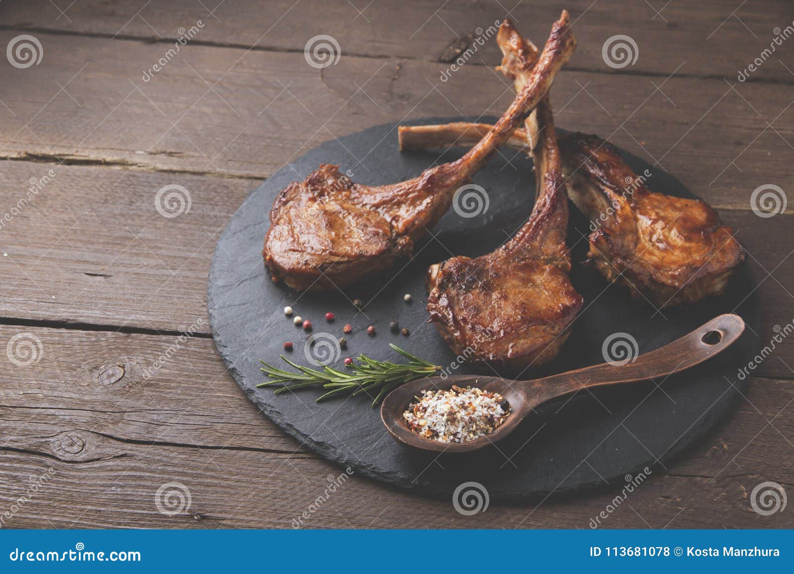 Roasted Lamb Ribs Loin Chop on a Stone Surface Stock Photo - Image of ...