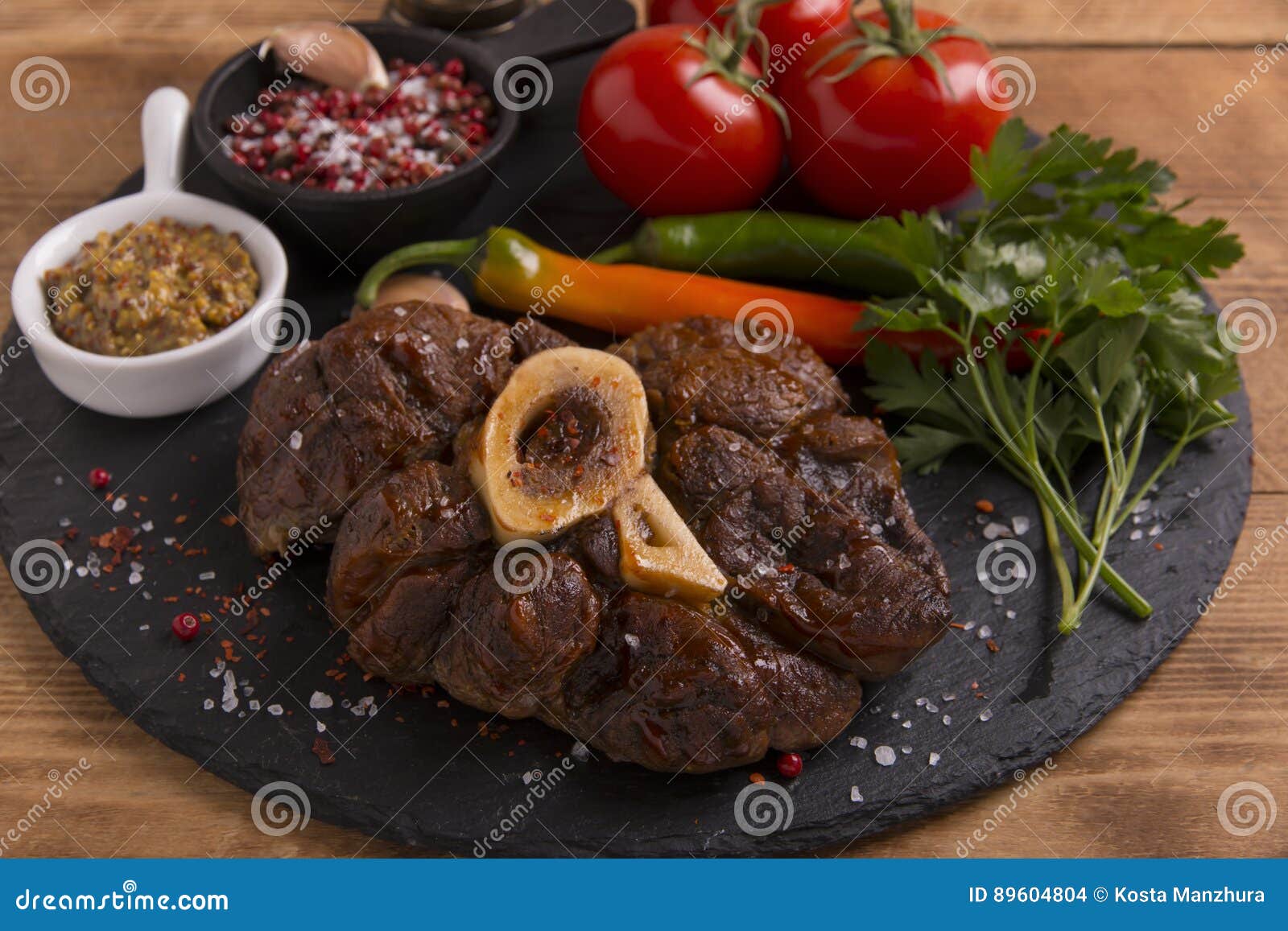 Raw Meat With Bone On Clay Plate And Brown Stone Background.Raw Meat ...