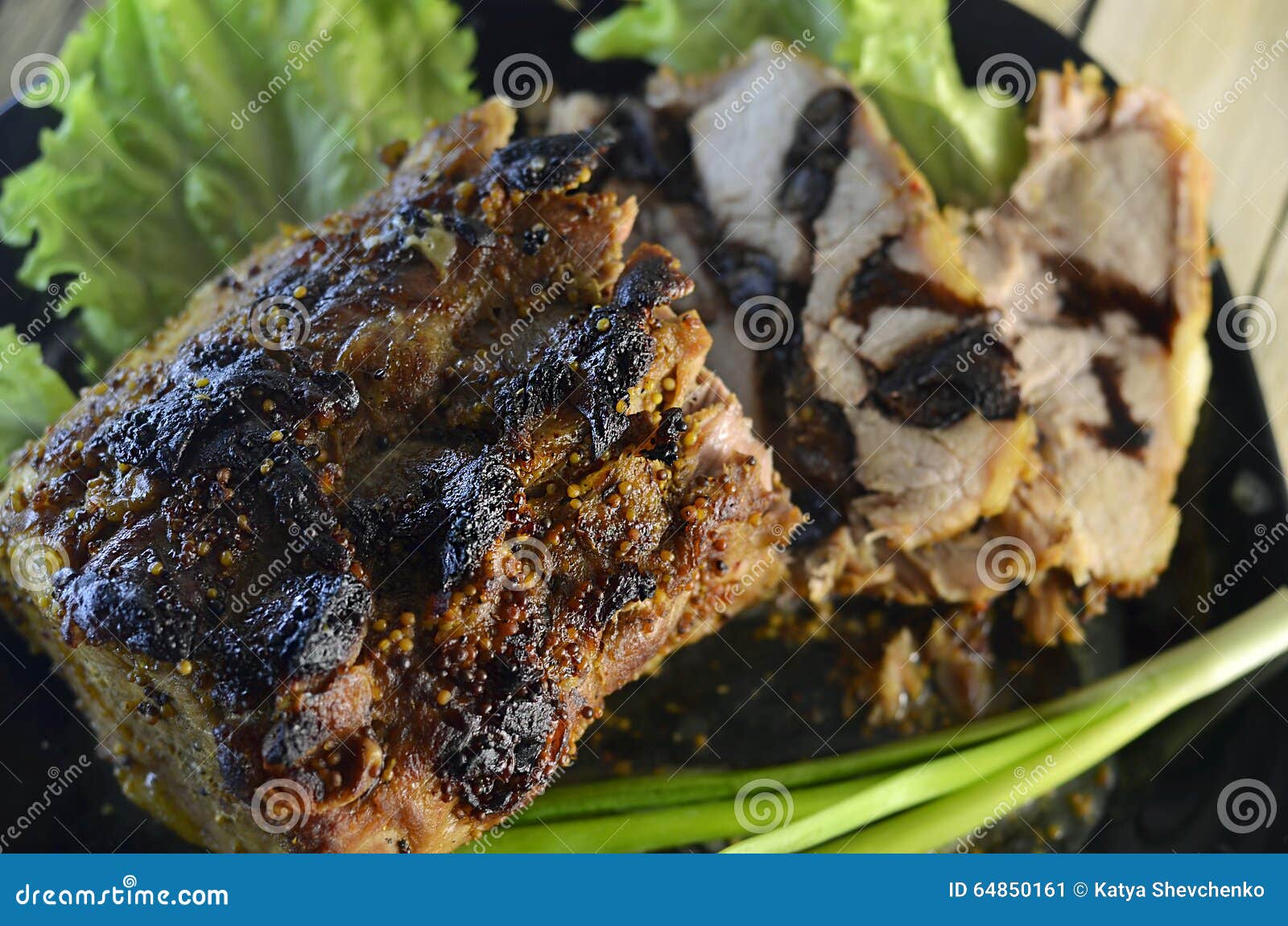 Roasted meat with prunes stock image. Image of kitchen - 64850161