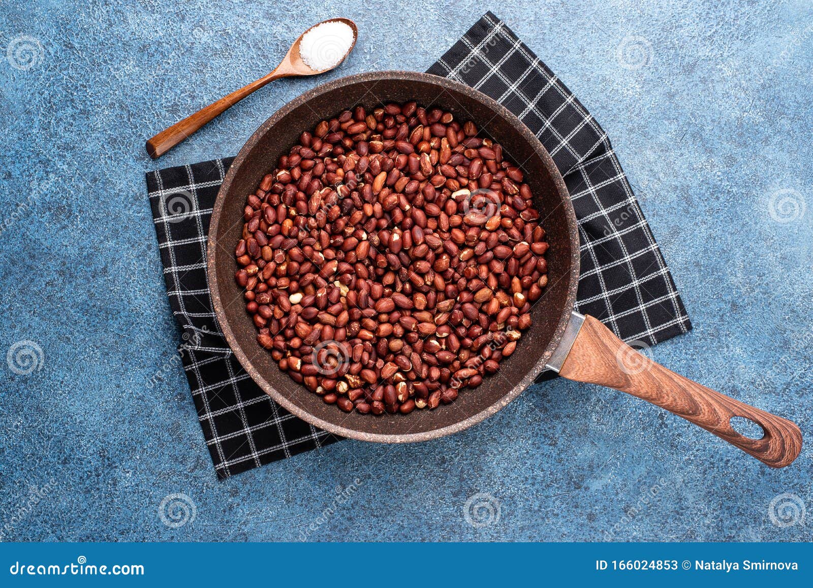 Roasted peanuts in a pan. stock image. Image of ingredient - 166024853