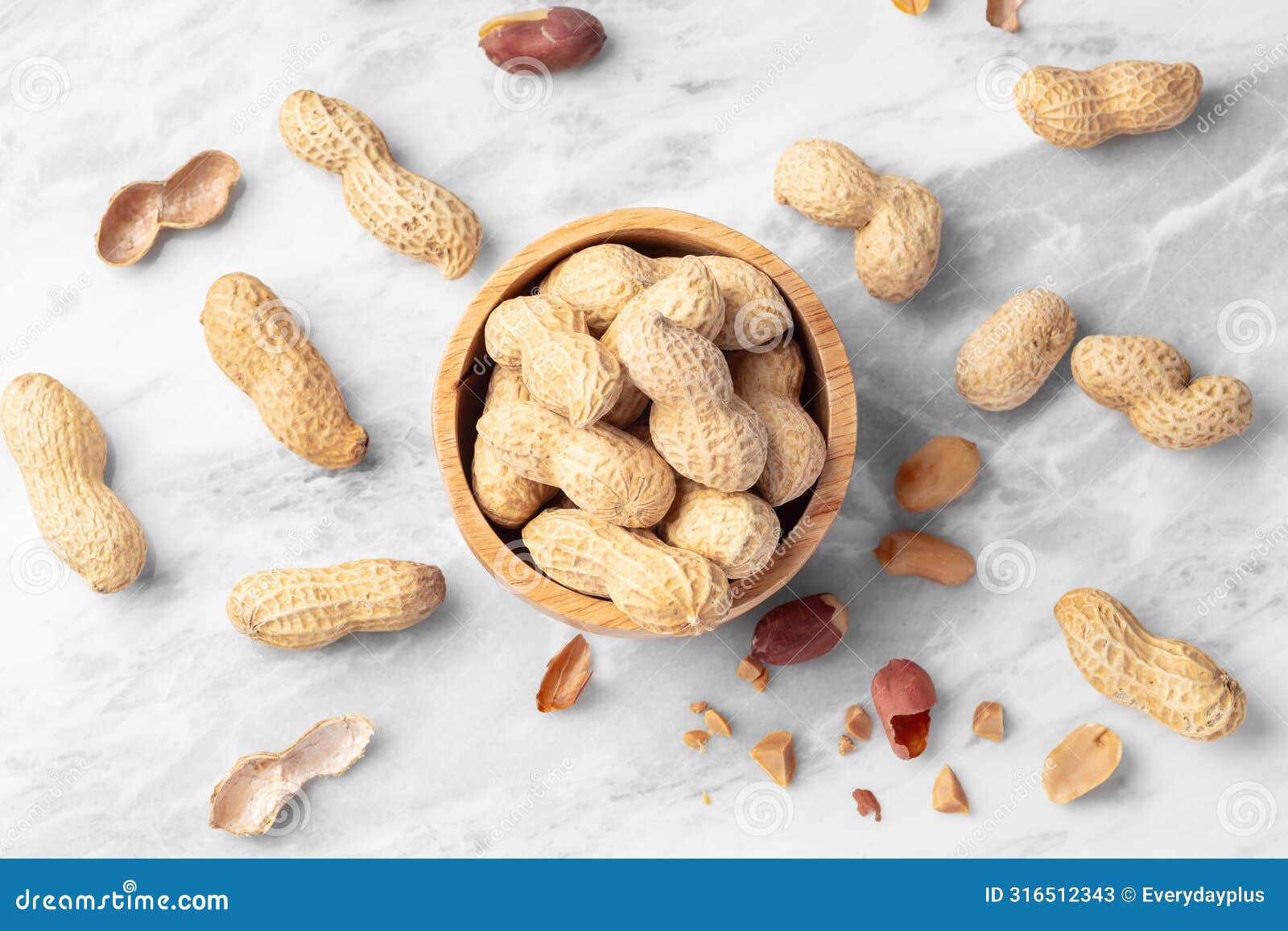 Roasted Peanuts with Shell in Wood Bowl on Marble Table, Top View Stock ...