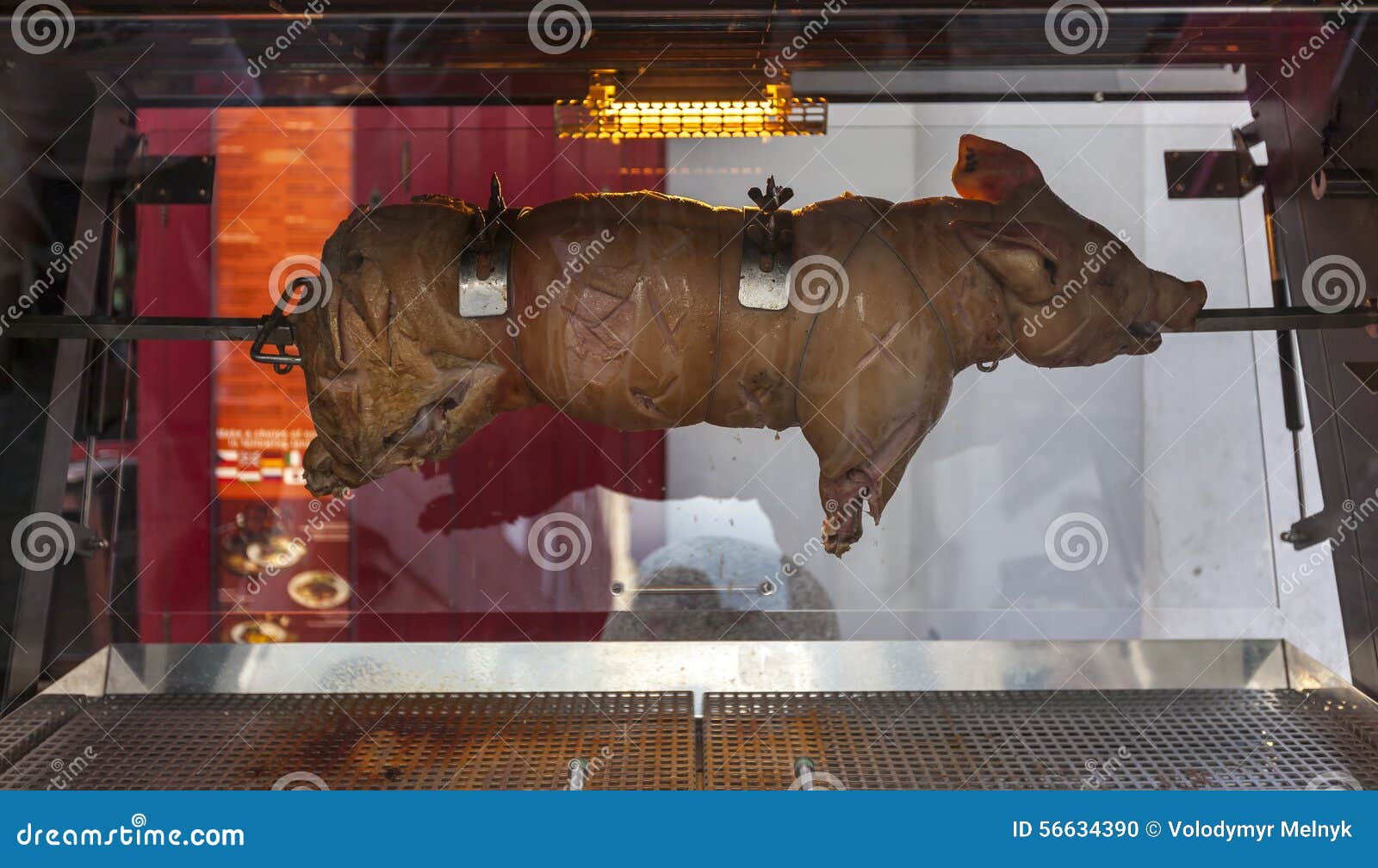 Roasted pig on the rack stock photo. Image of dinner - 56634390