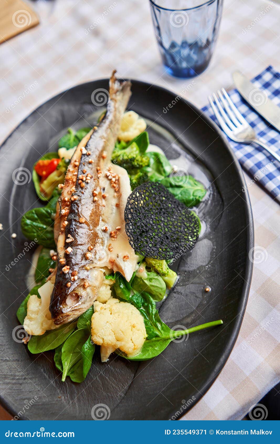 Roasted Pike Perch or Cod Fish with Baked Vegetables and Spinach. Dish ...