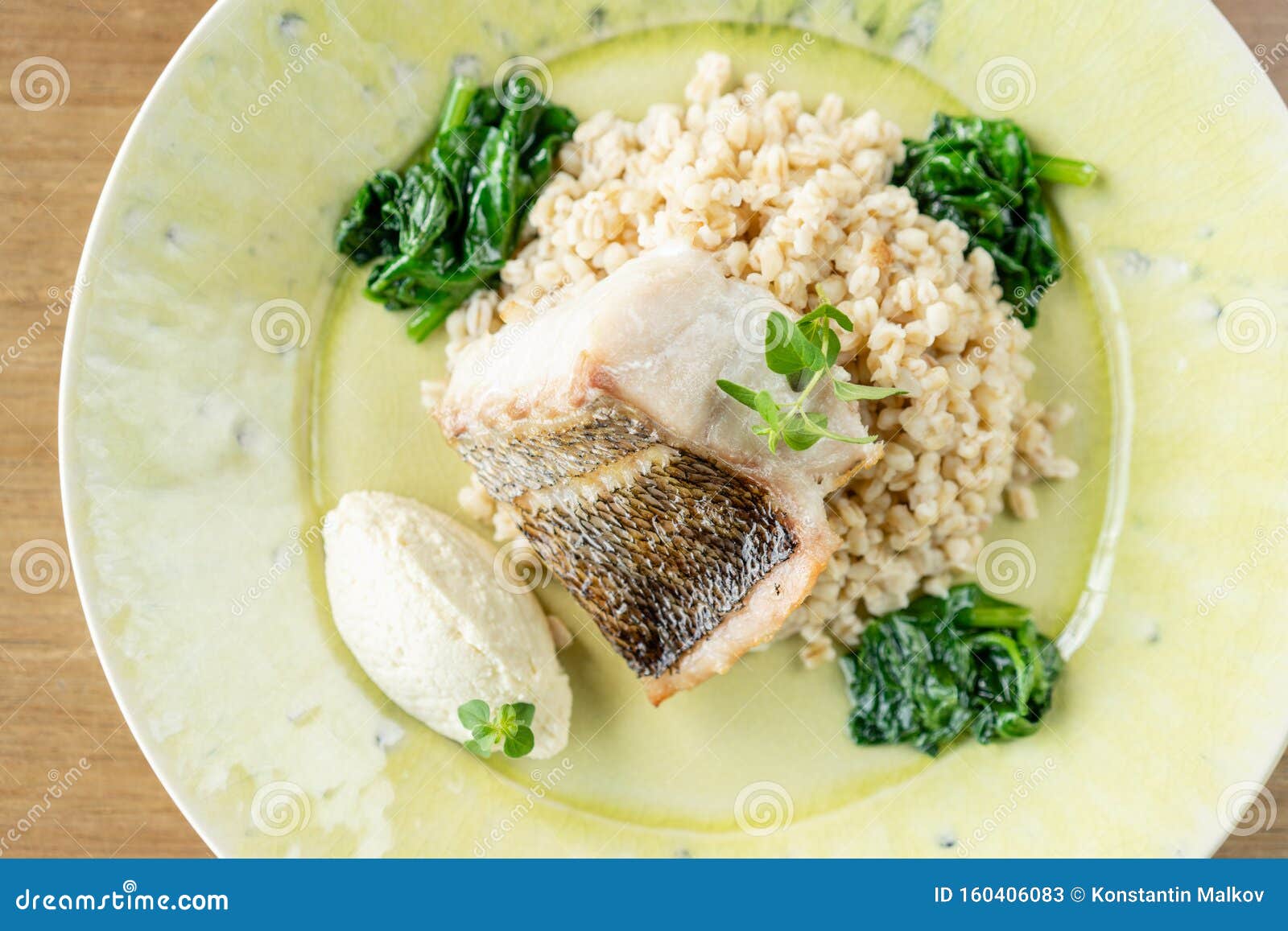 Roasted Pike Perch or Cod Fish with Bulgur. Dish Decorated with a ...