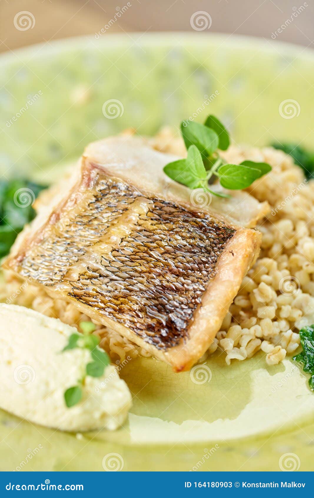 Roasted Pike Perch with Spelt and Polish Sauce. Dish Decorated with a ...