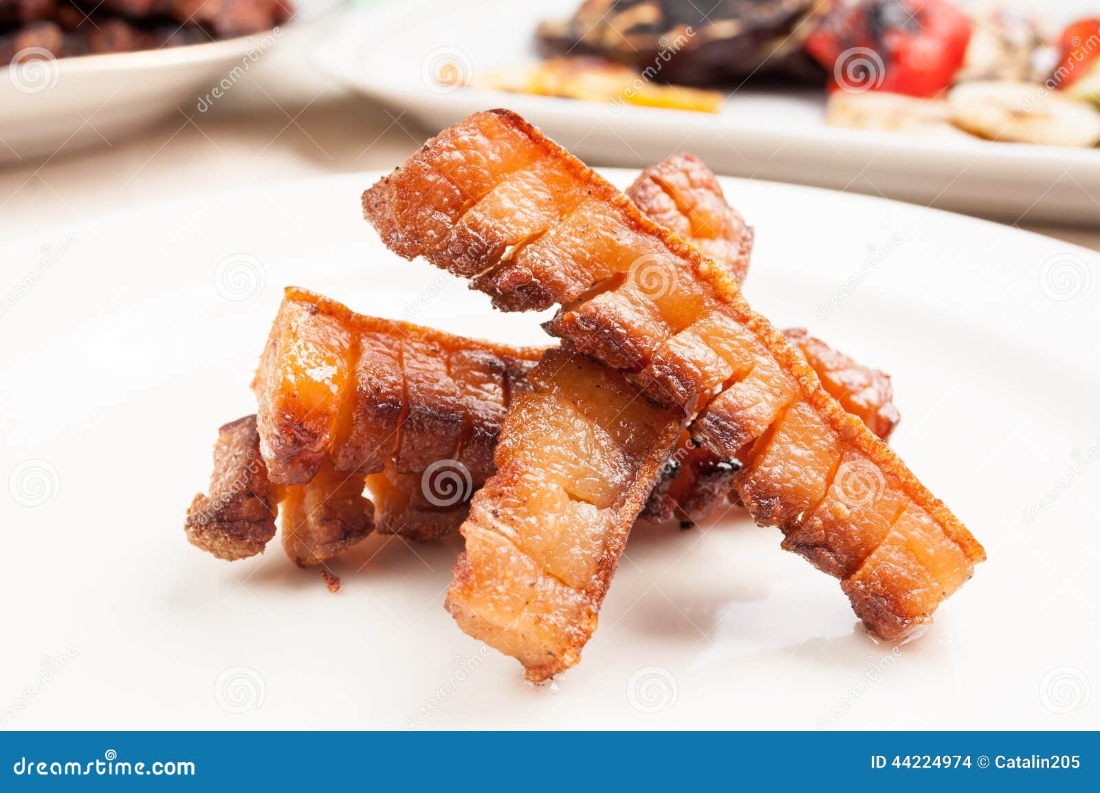 Roasted Pork Panceta on a Plate Stock Photo - Image of grilled, macro ...