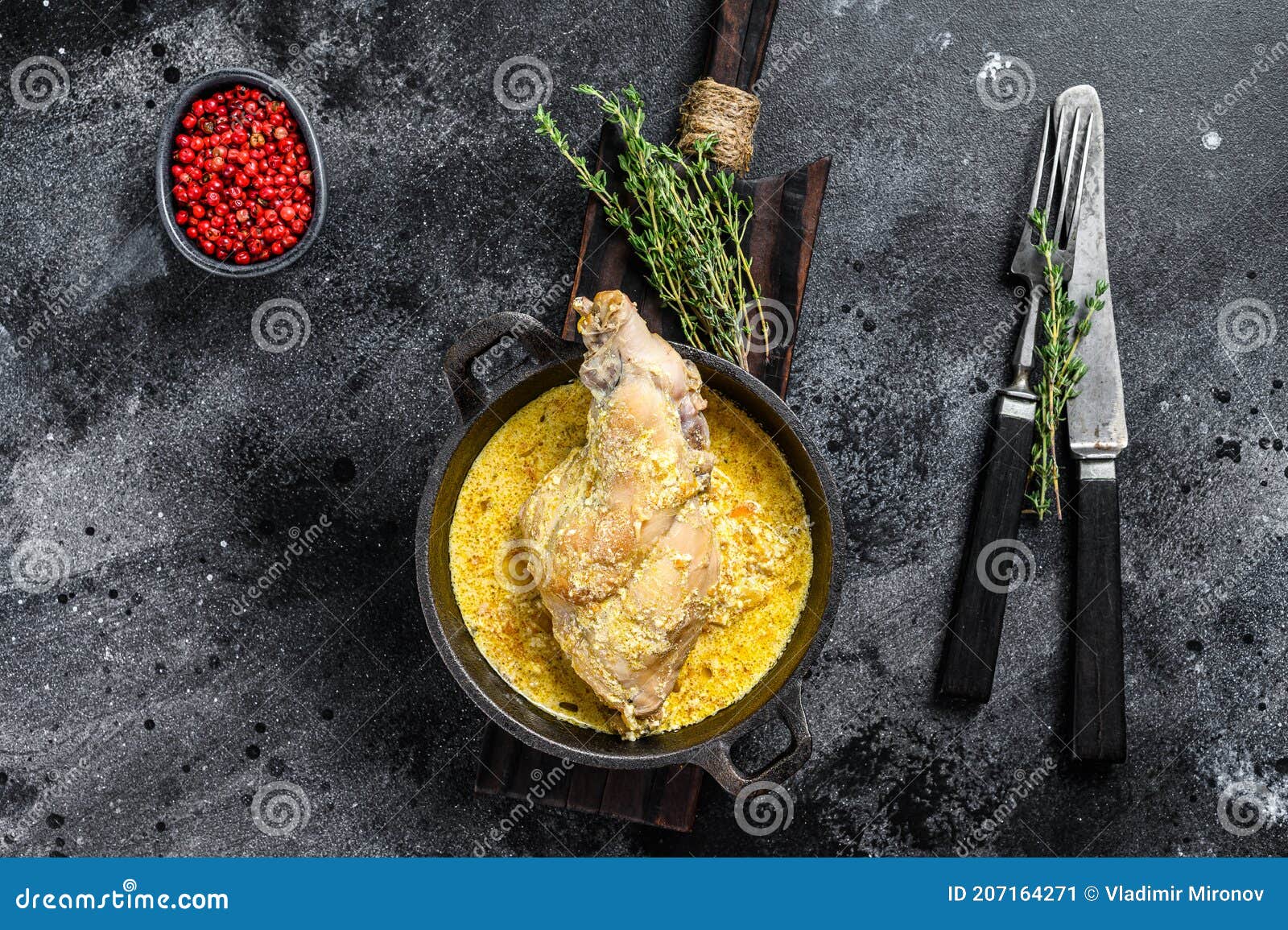 Roasted Rabbit Haunches in Pan with Stewed Vegetables. Black Background ...