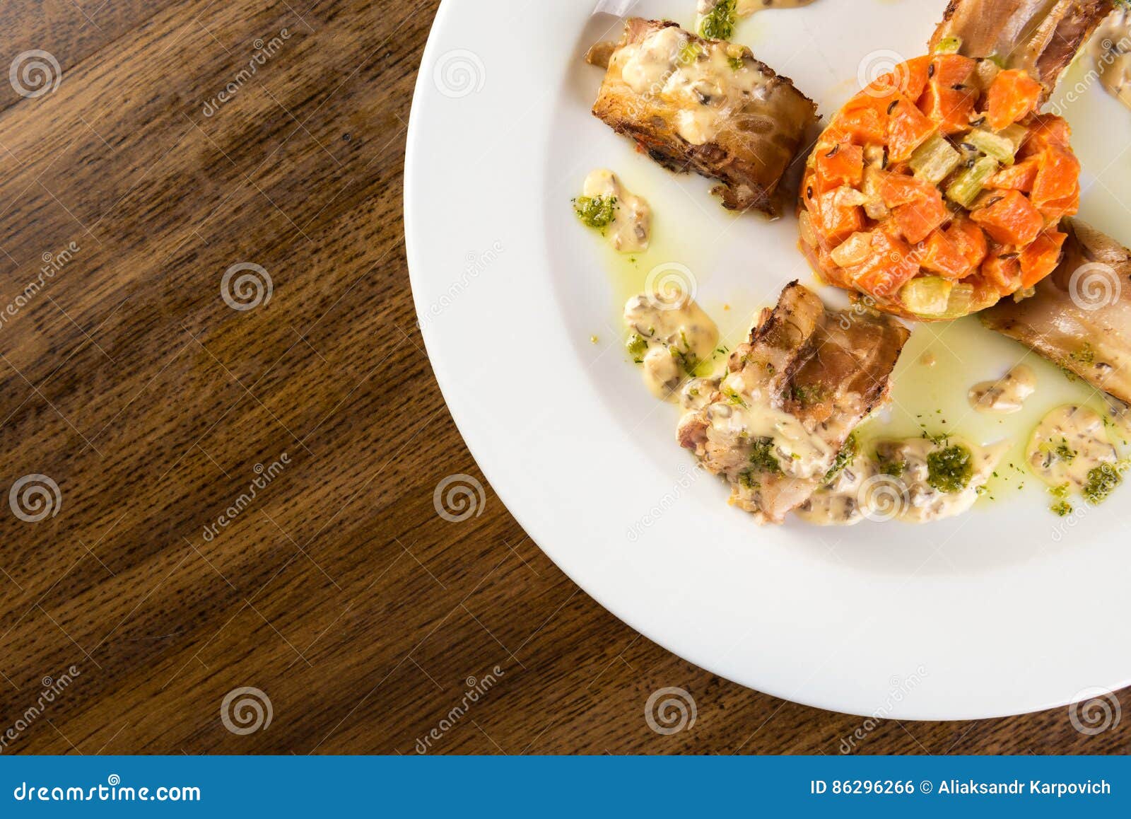 Roasted Rabbit Roulade with Carrot and Sauce Stock Photo - Image of ...