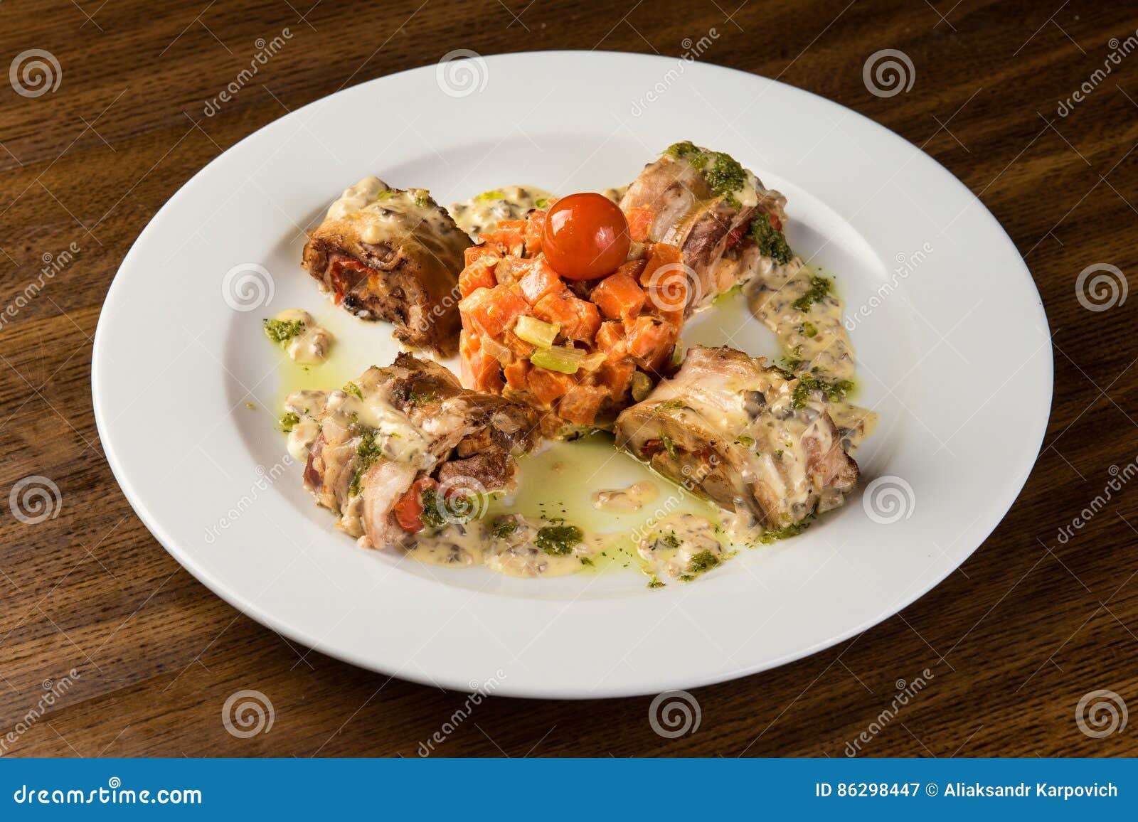 Roasted Rabbit Roulade with Carrot and Tomato Stock Image - Image of ...
