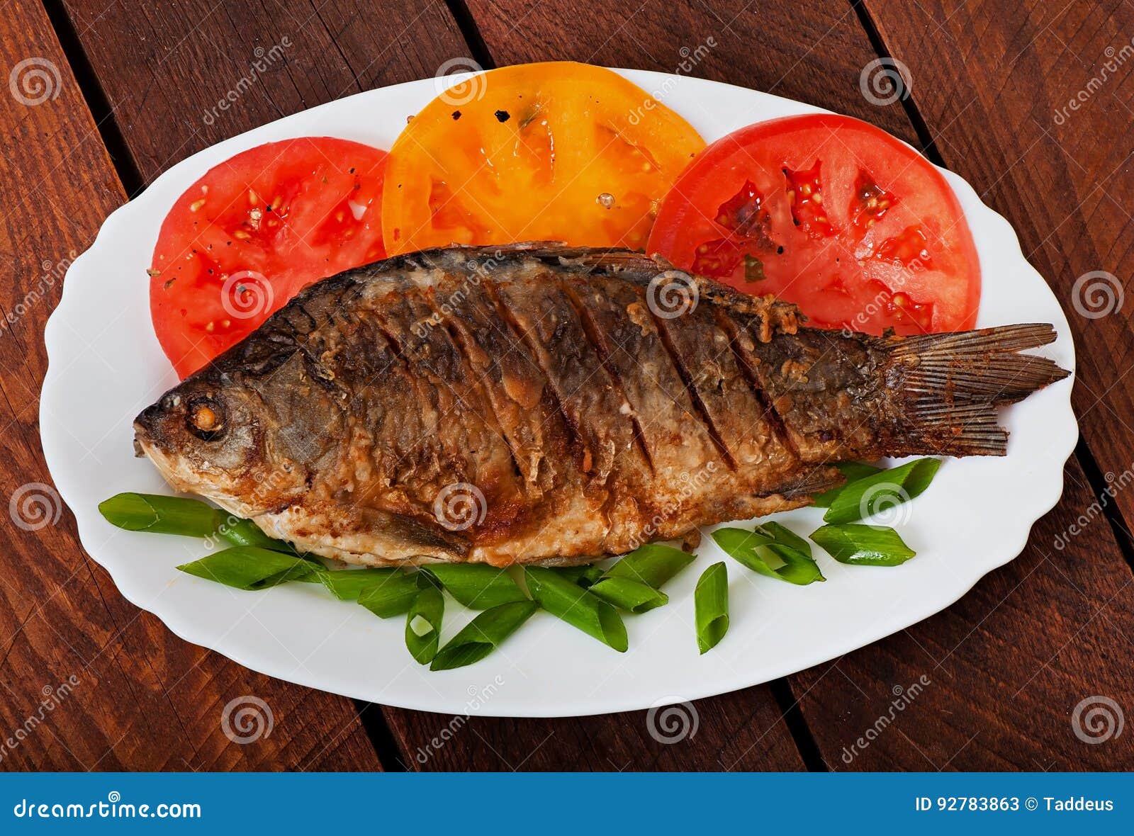 Roasted River Fish Carp on a White Plate Stock Image - Image of tomato ...