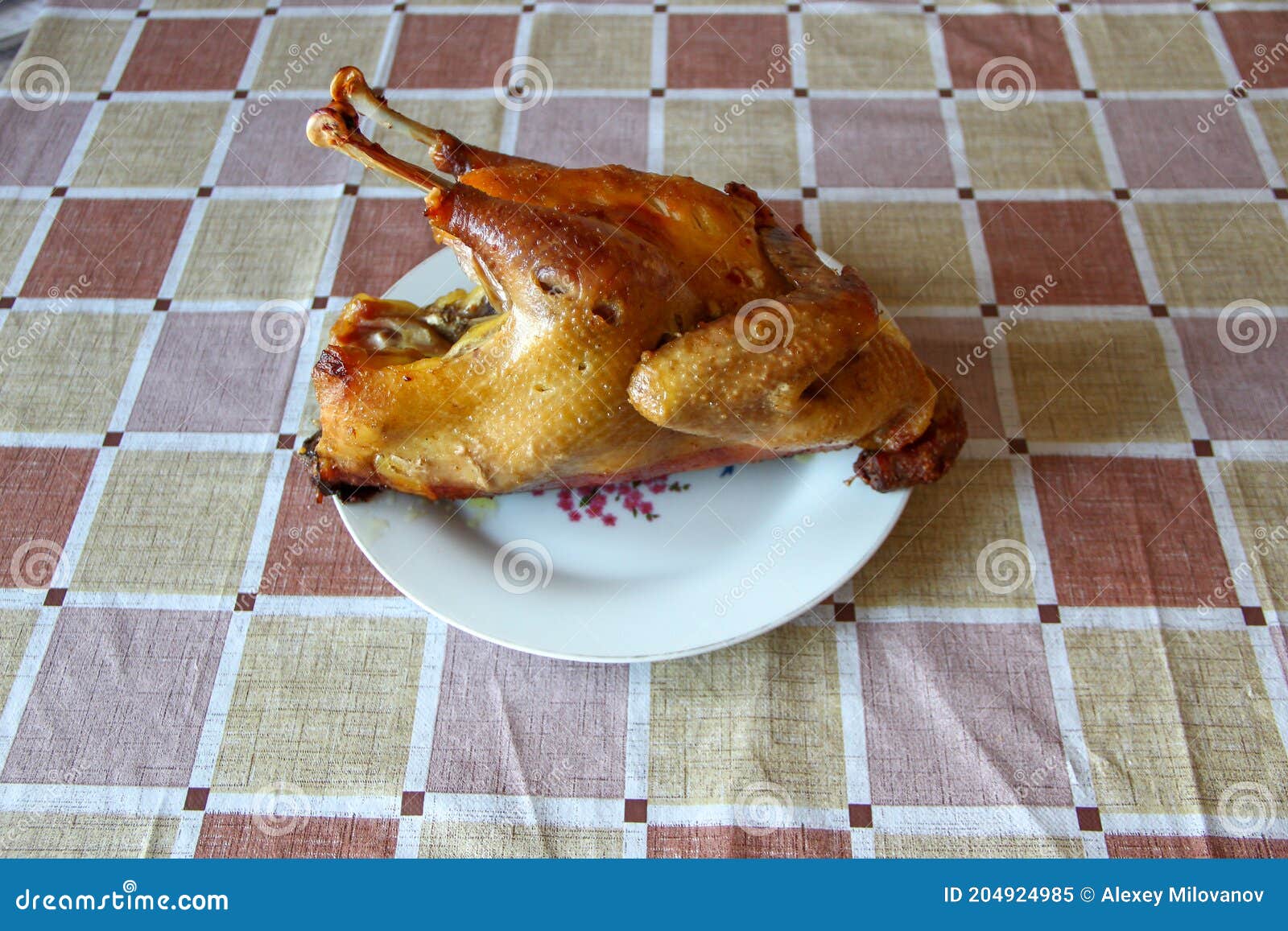 Roasted rooster on a plate stock image. Image of cocker - 204924985
