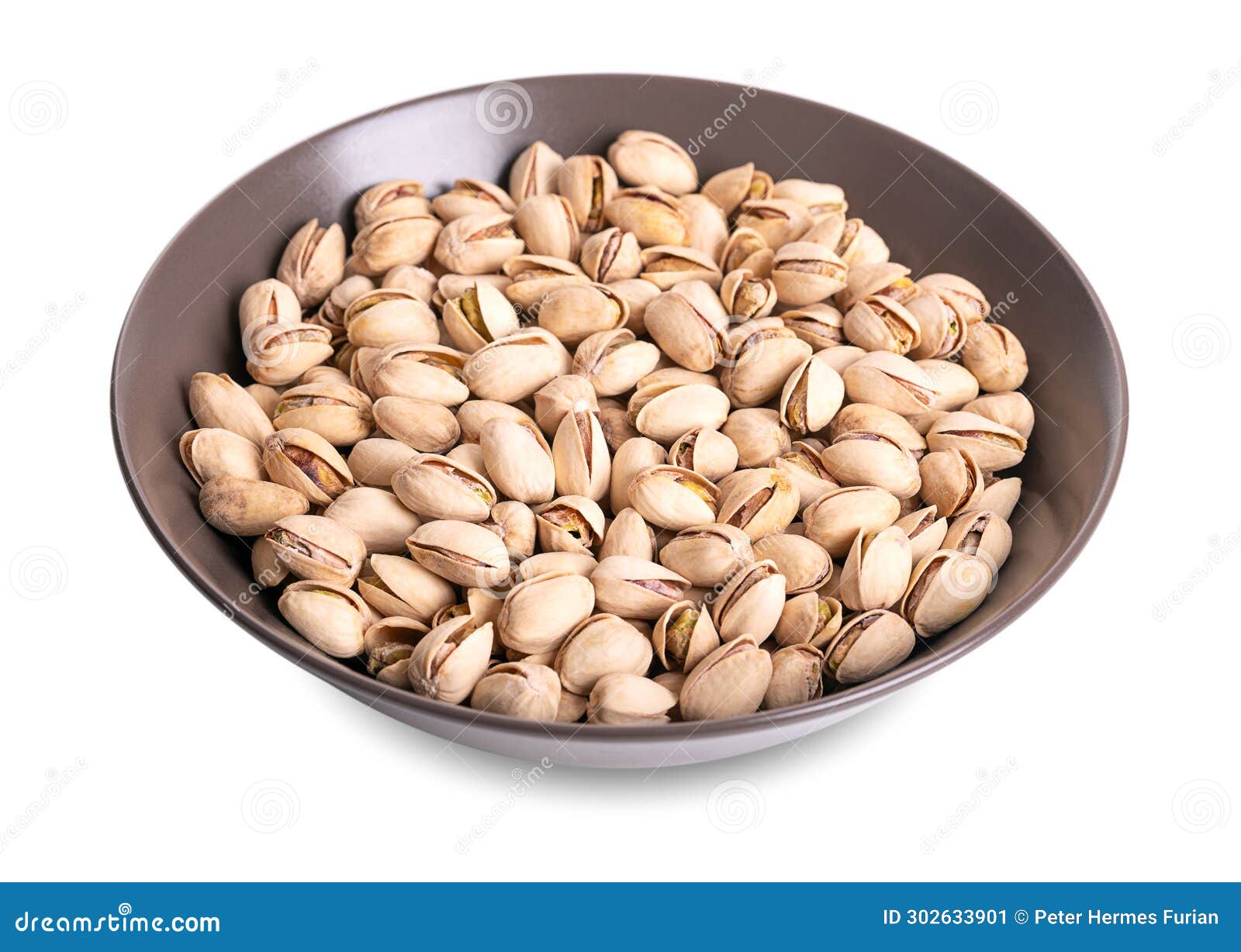 Roasted and Salted Pistachios in Their Shells, in a Brown Bowl Stock ...
