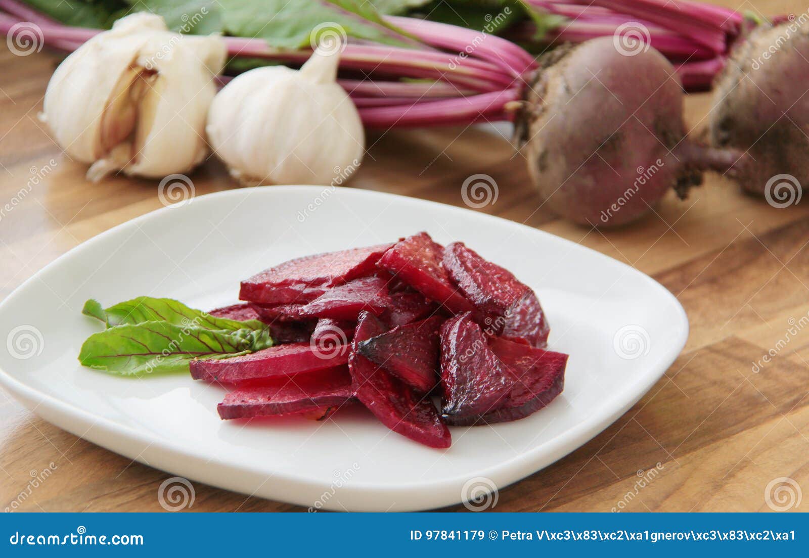 Roasted Slices of Beetroot Served on a White Plate. Fresh Vegetables on ...
